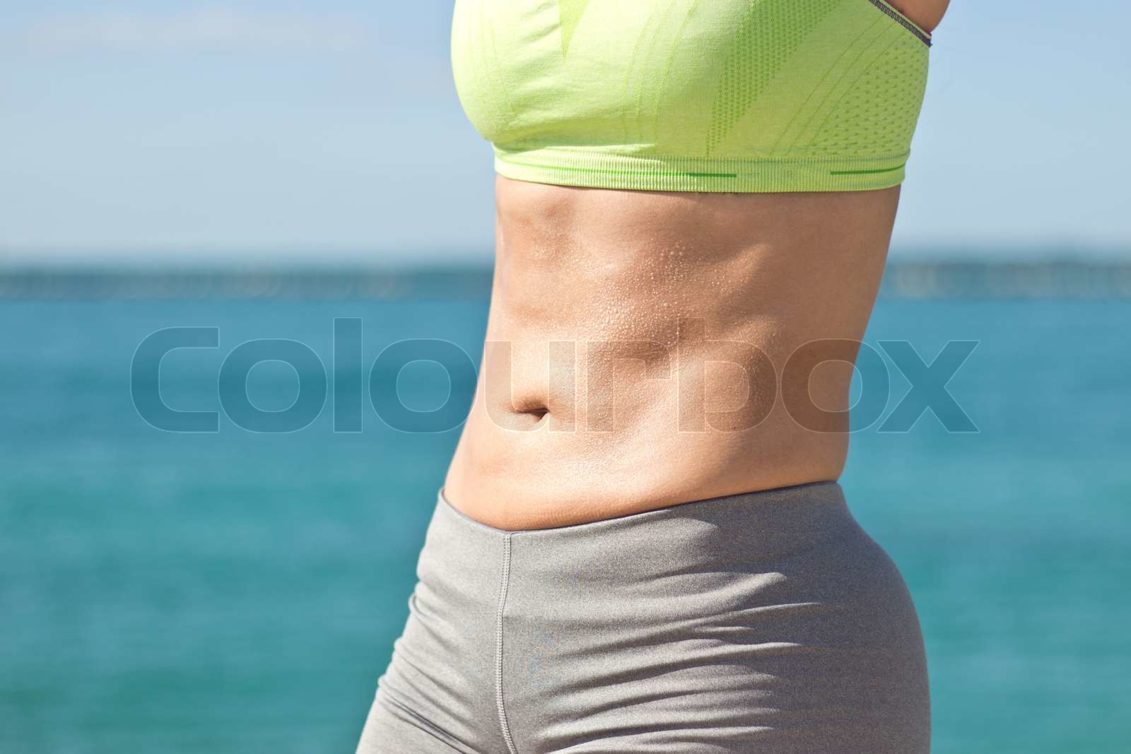 Woman's muscular stomach | Stock image | Colourbox