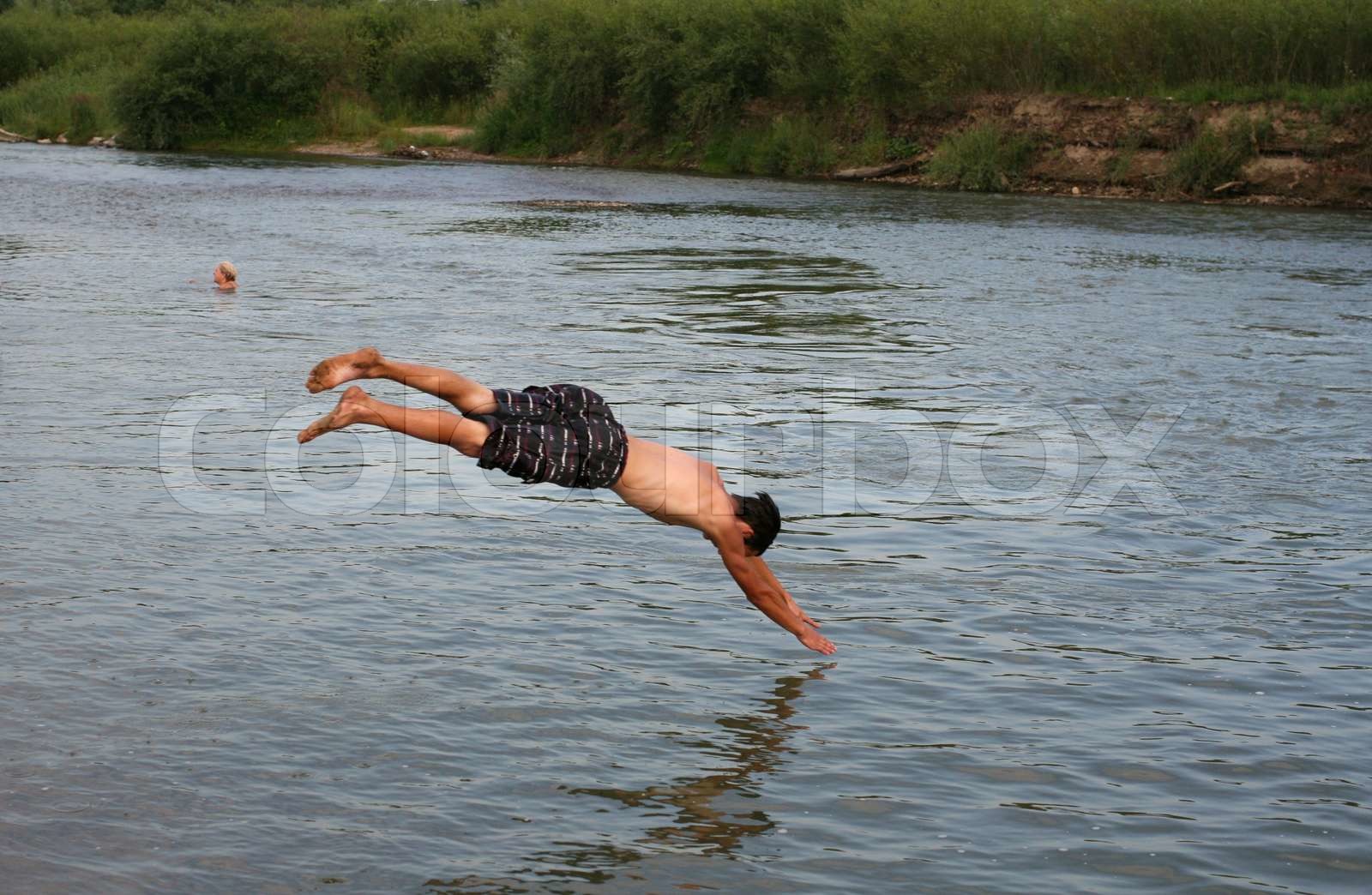 People swim in the river | Stock image | Colourbox