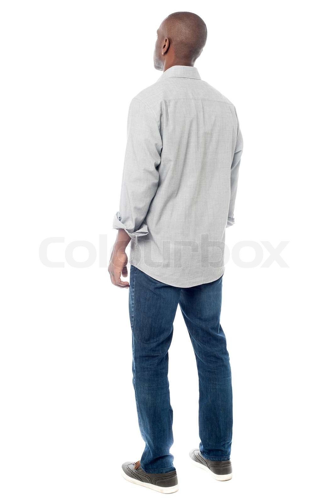 Back view of handsome man looking up | Stock image | Colourbox