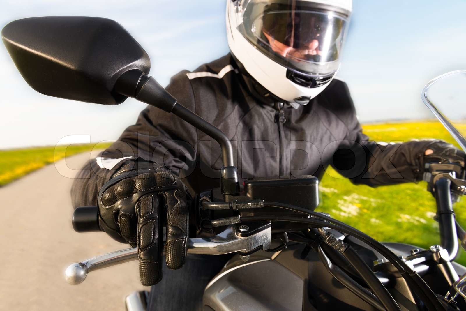 Biker on the road | Stock image | Colourbox