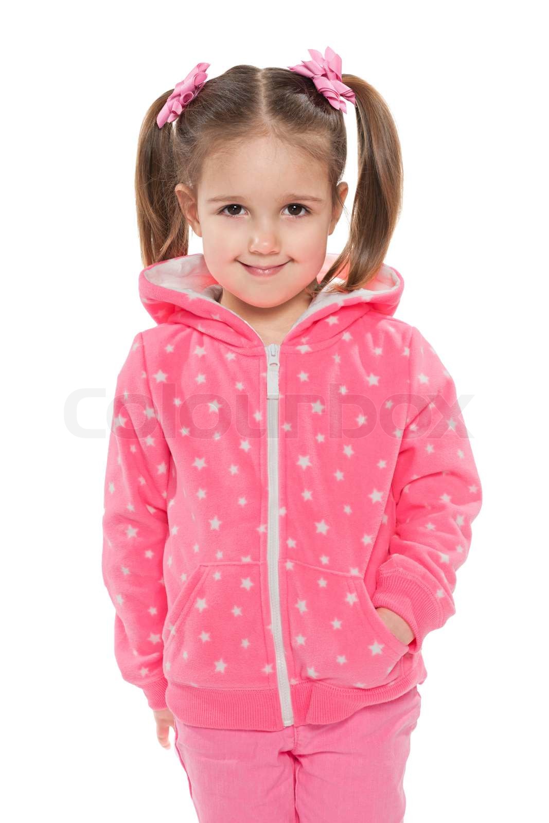 Smiling preschool girl against the white | Stock image | Colourbox