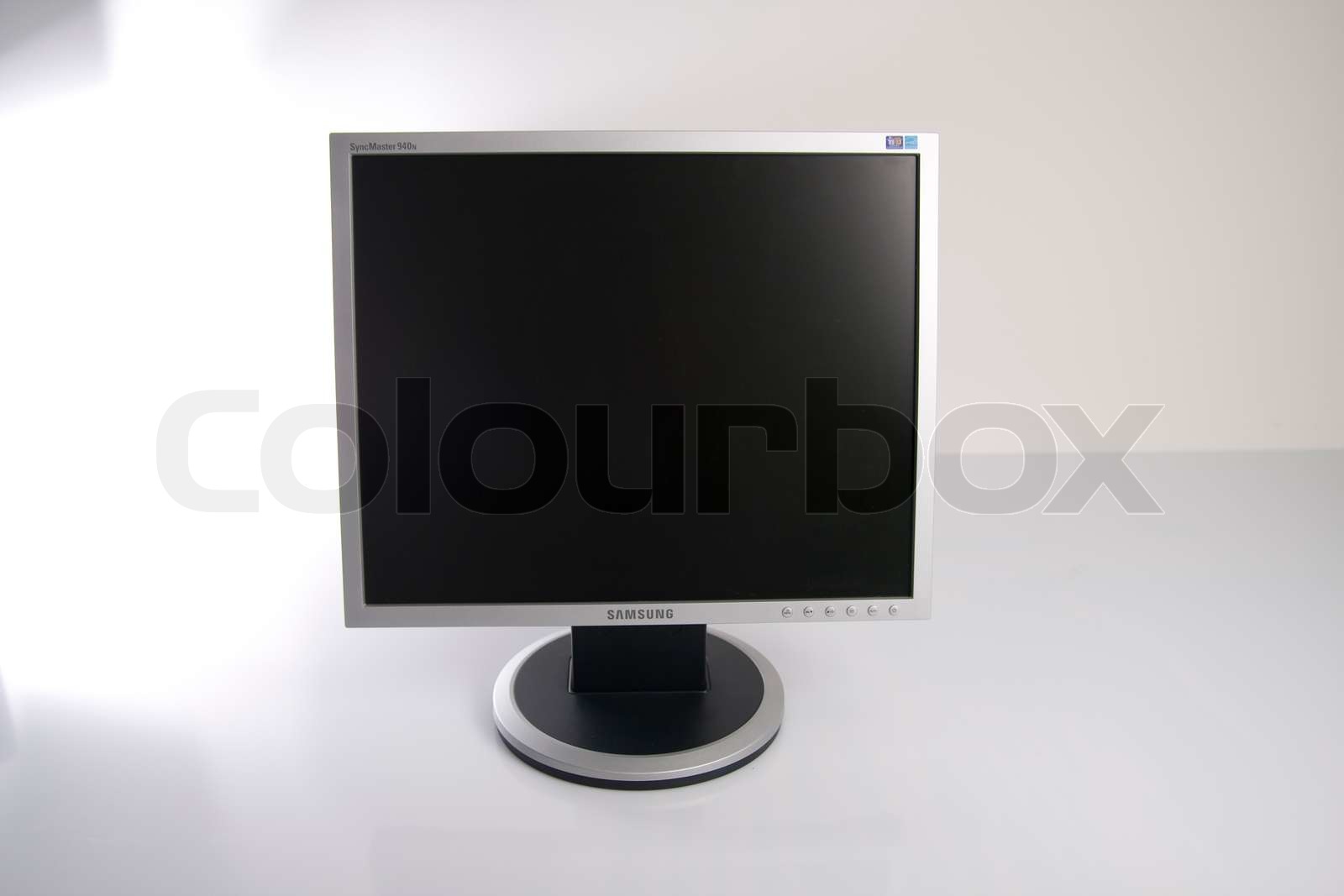 Black screen monitor on a desk | Stock image | Colourbox