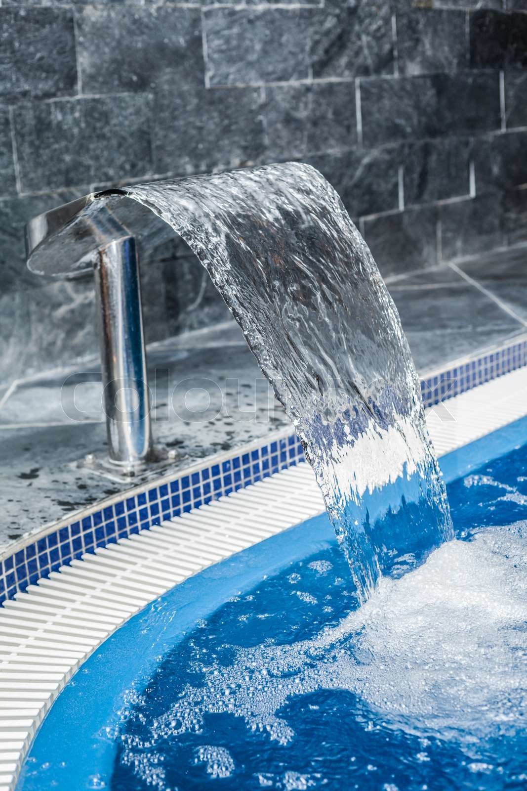 Flowing water in swimming pool | Stock image | Colourbox