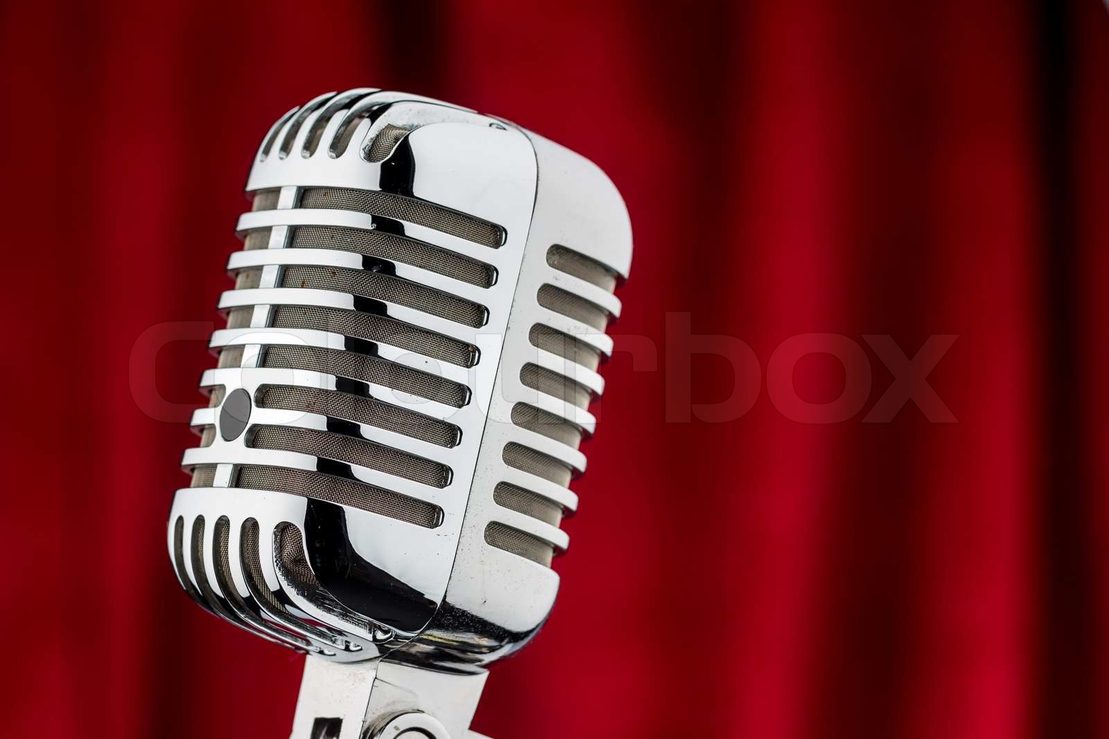 retro microphone against red velvet | Stock image | Colourbox