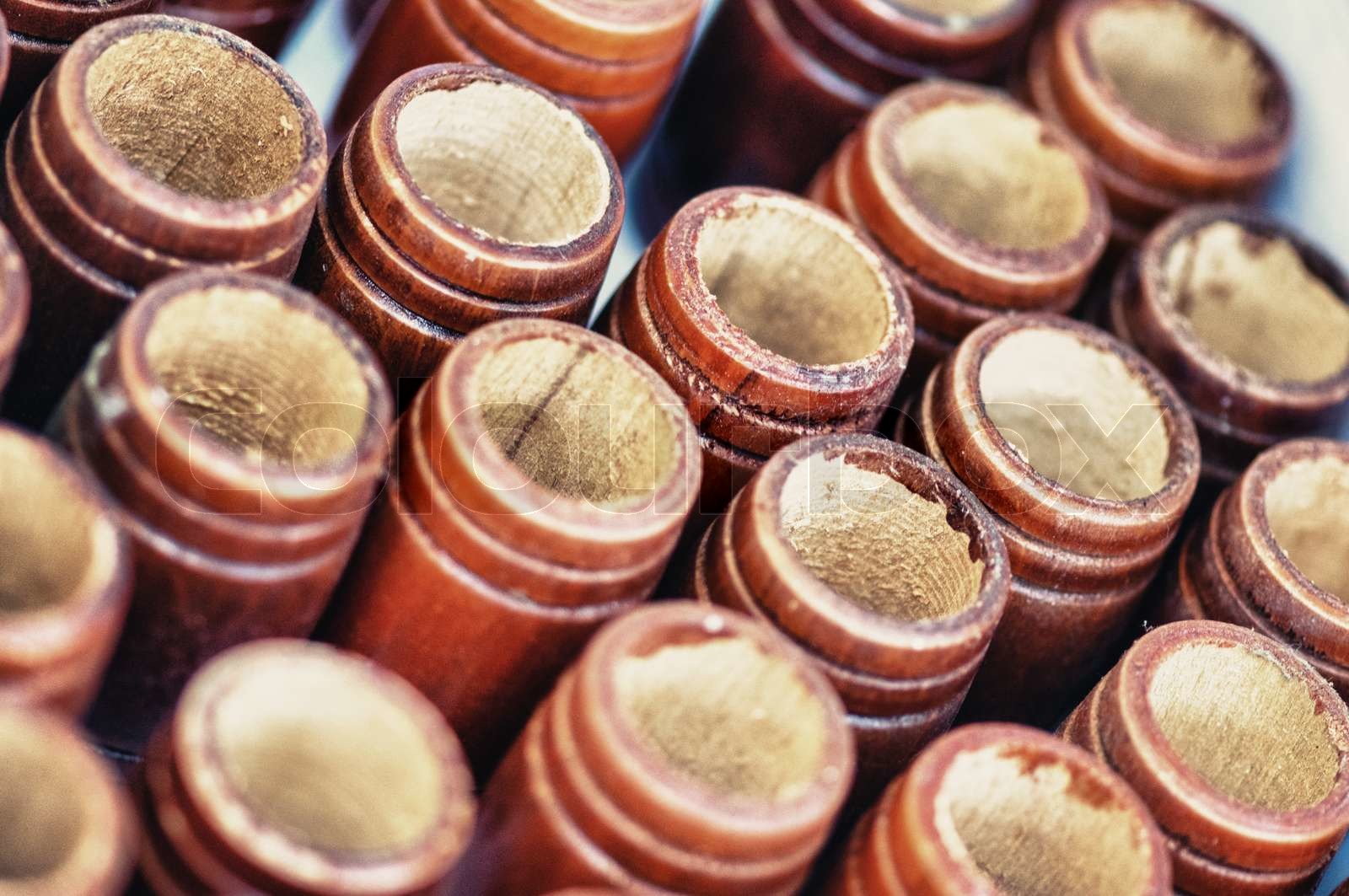 Wooden cylinder containers | Stock image | Colourbox