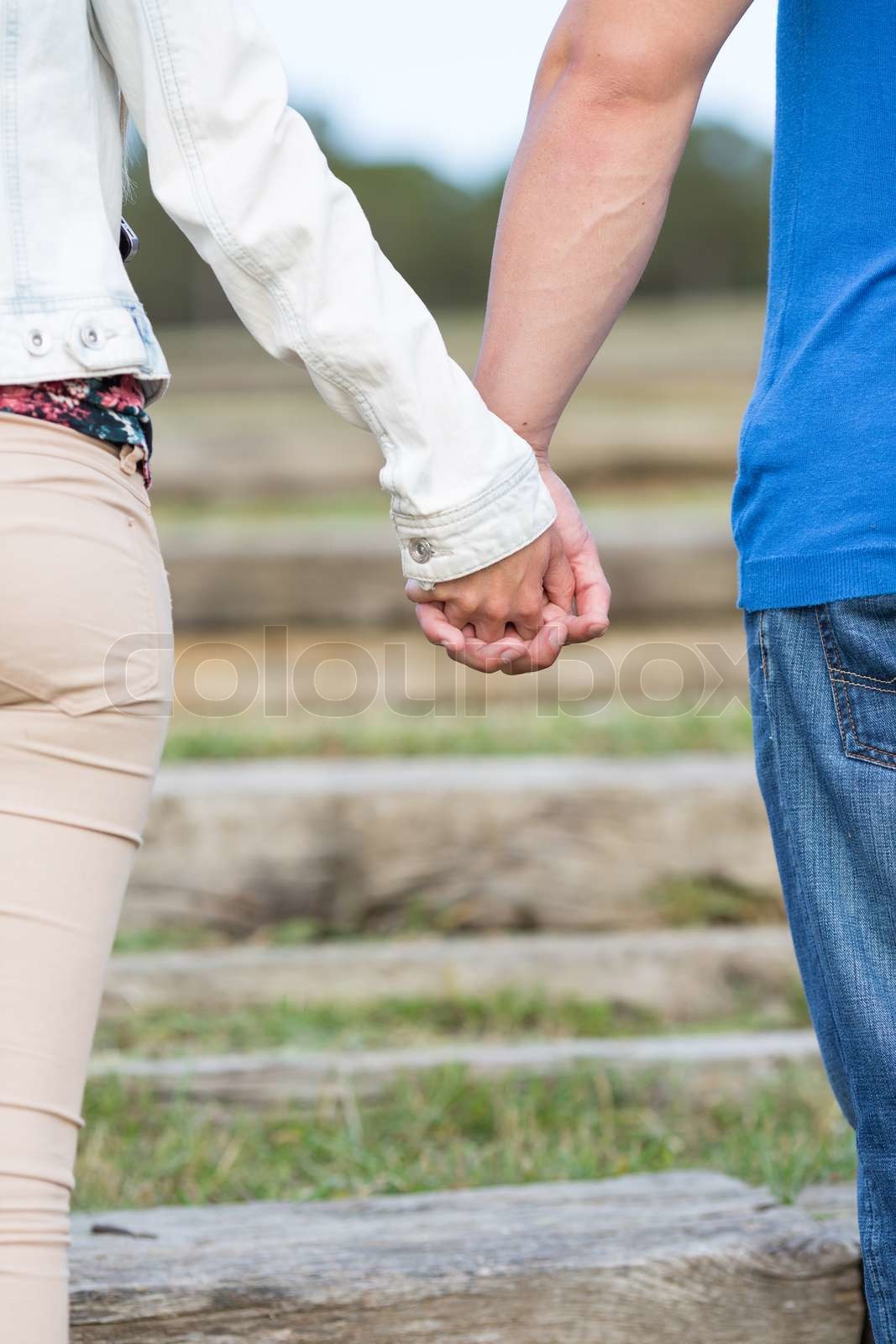 Holding hands couple | Stock image | Colourbox