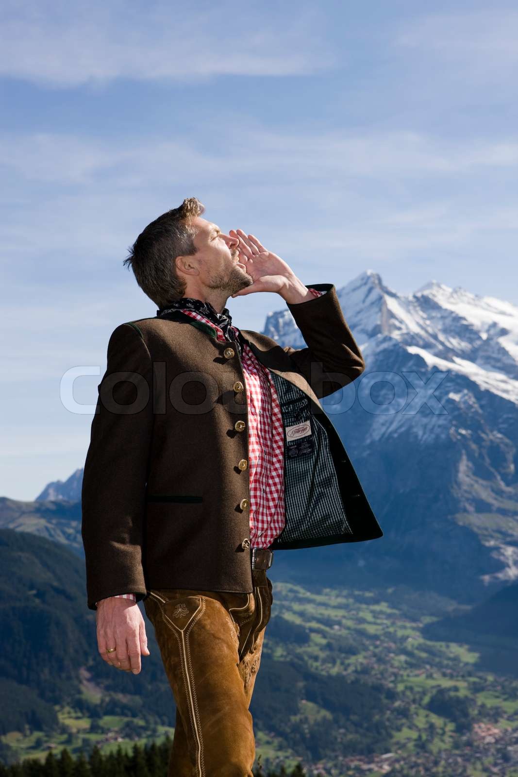 A yodelling man in Bavarian costume | Stock image | Colourbox