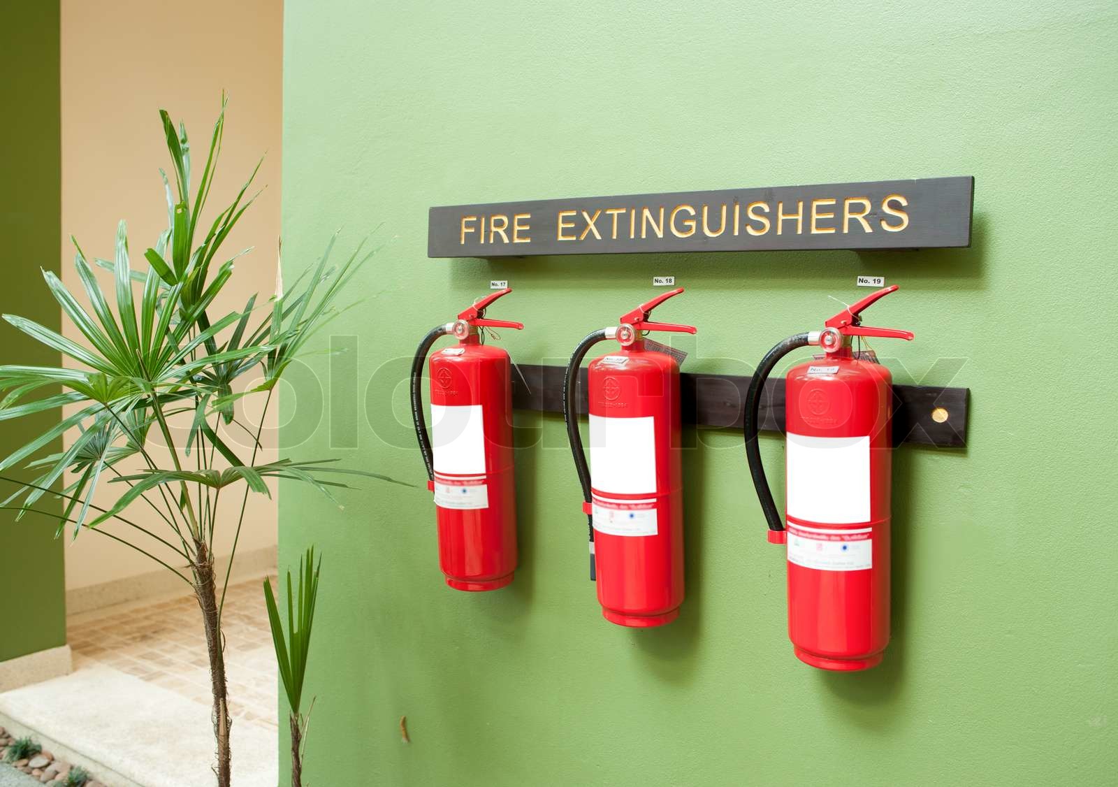 Fire Extinguishers on Wall | Stock image | Colourbox