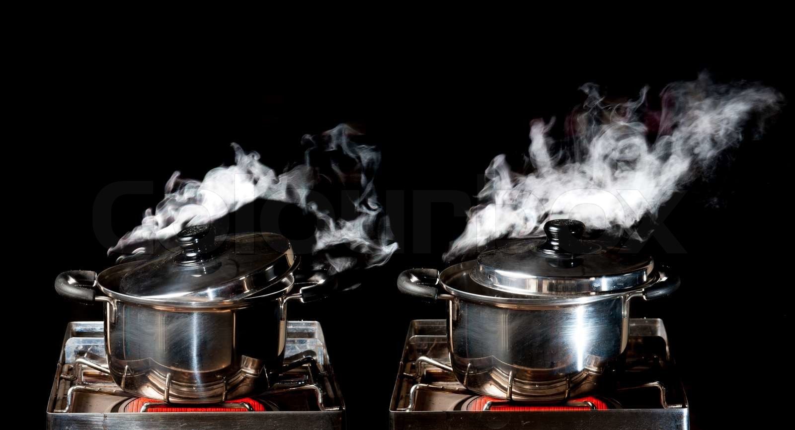 steam over cooking pot | Stock image | Colourbox