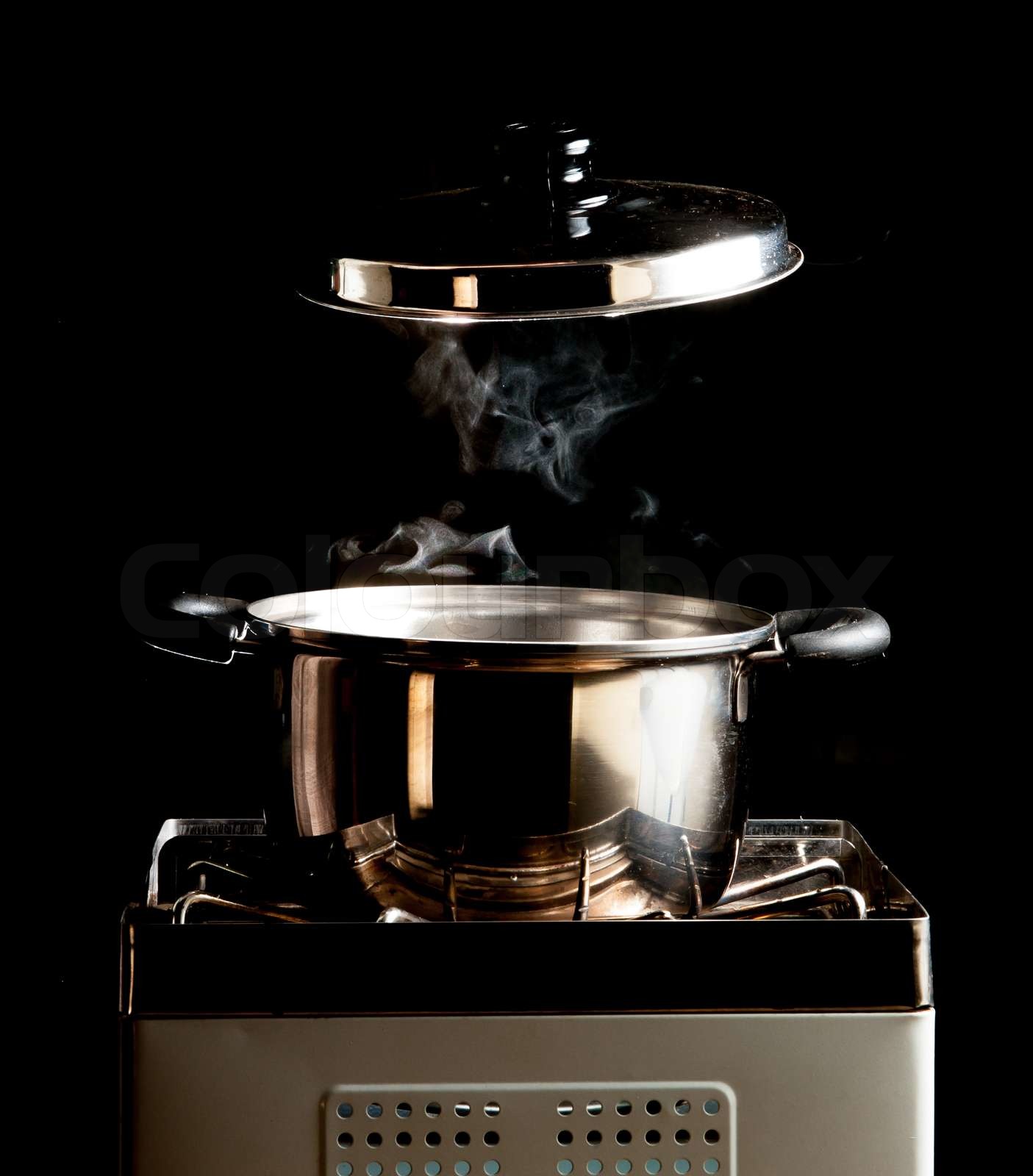 steam over cooking pot | Stock image | Colourbox