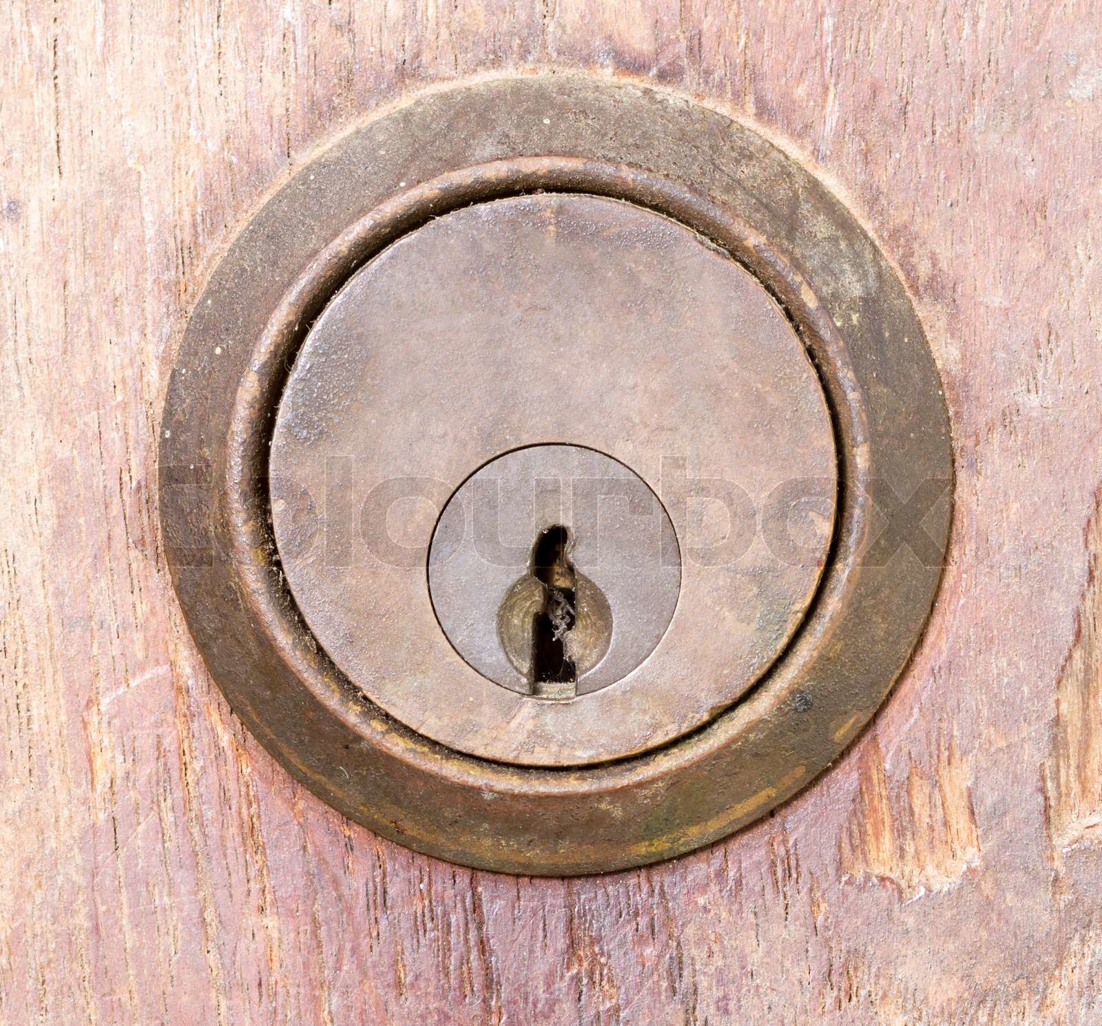 Aged keyhole on wooden wall | Stock image | Colourbox