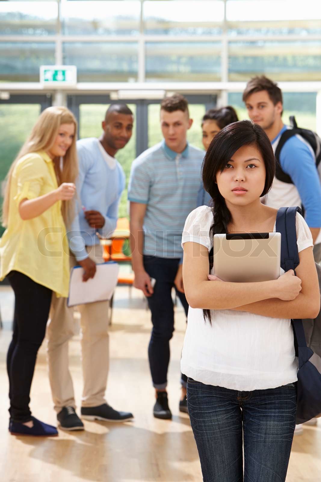 Female Student Being Bullied By Classmates | Stock image | Colourbox