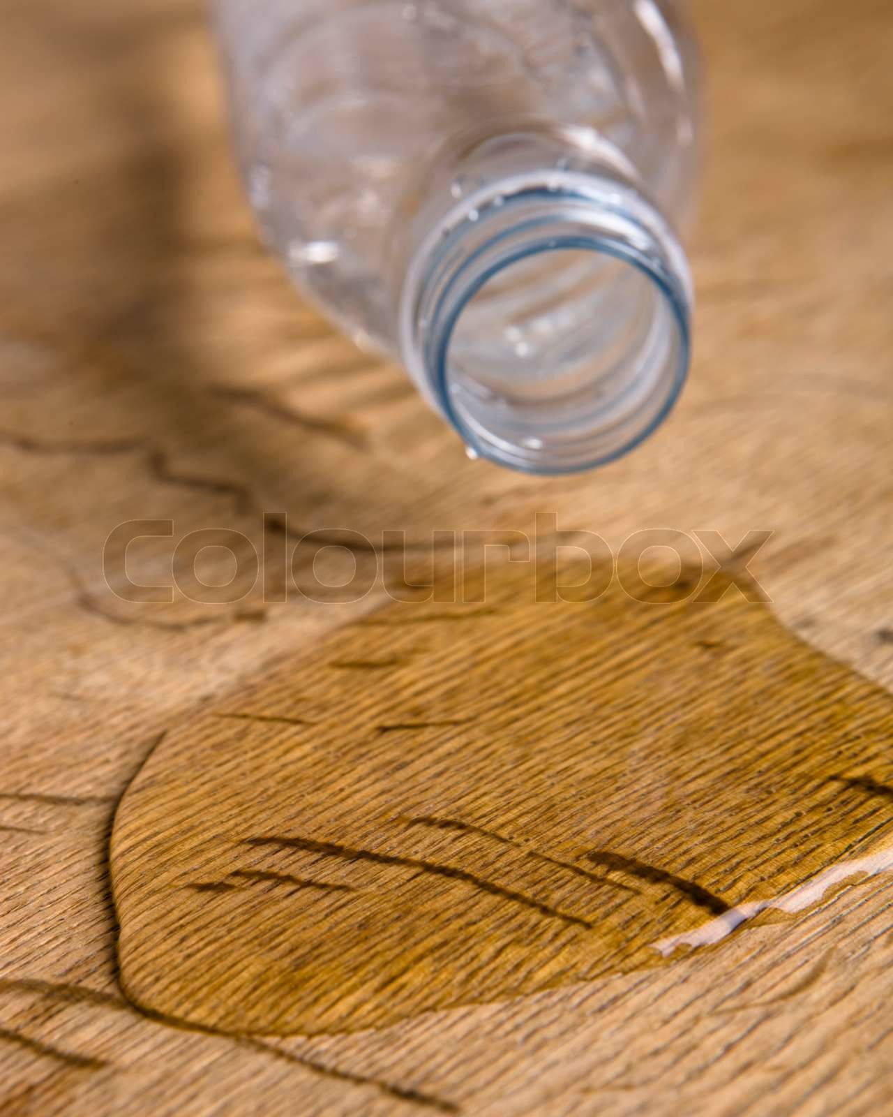 Spilled water from a bottle | Stock image | Colourbox