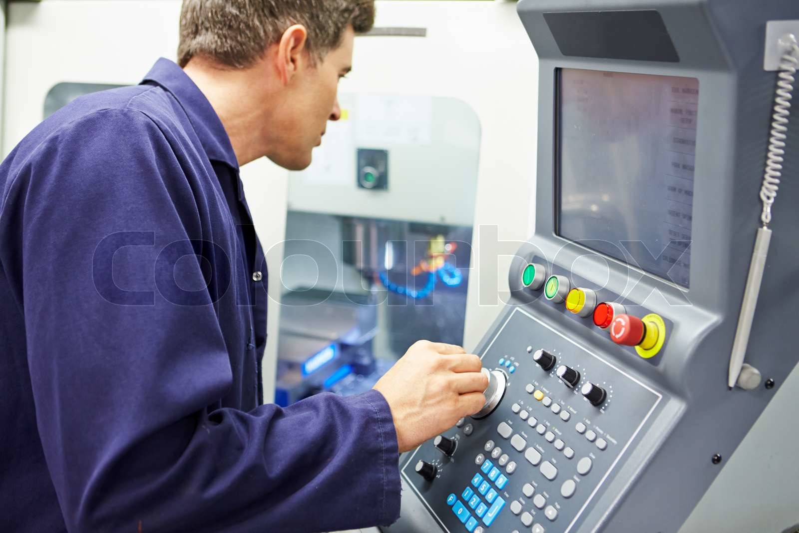 Engineer Operating Computer Controlled Milling Machine | Stock image ...