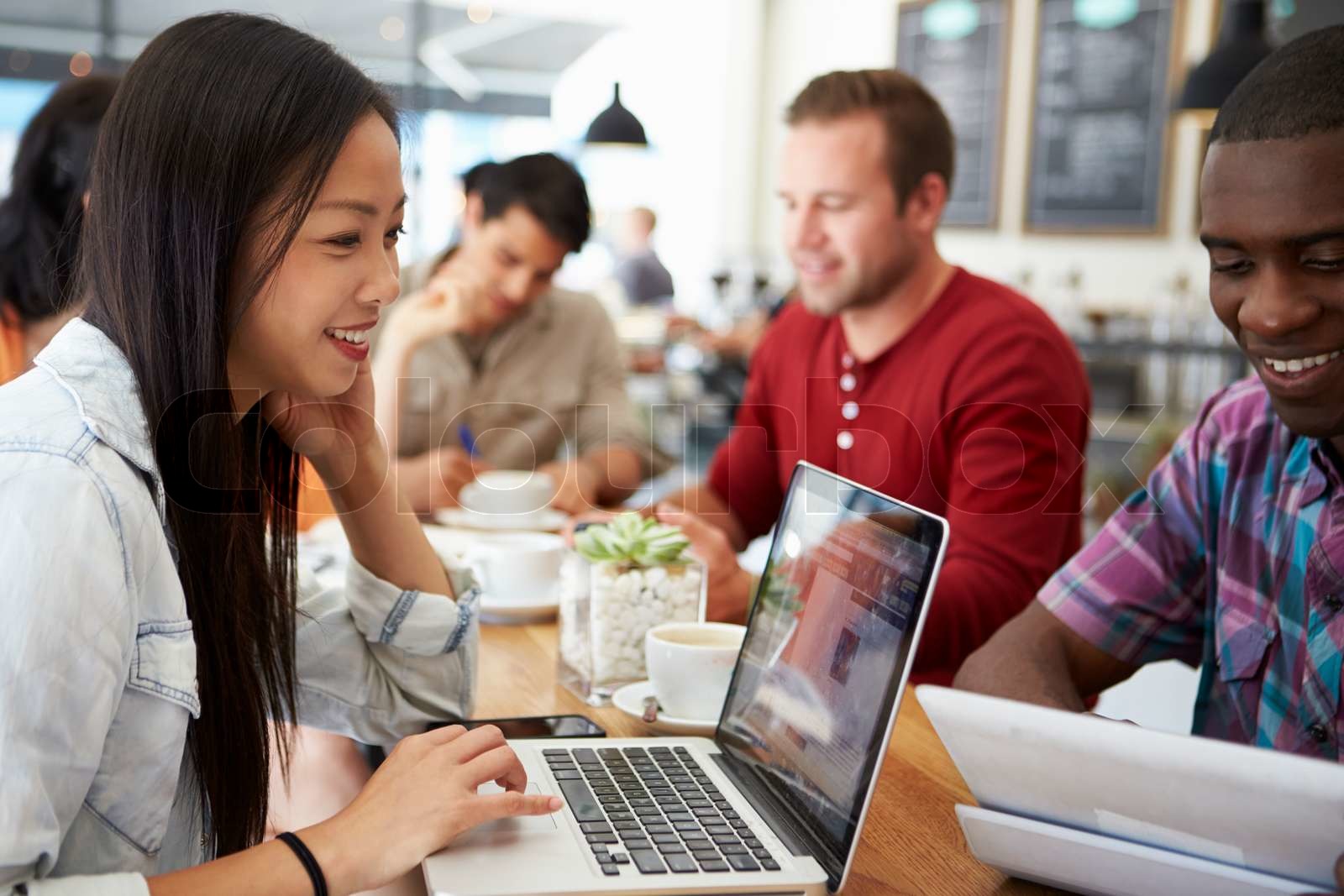 Customers In Busy Coffee Shop Stock Image Colourbox