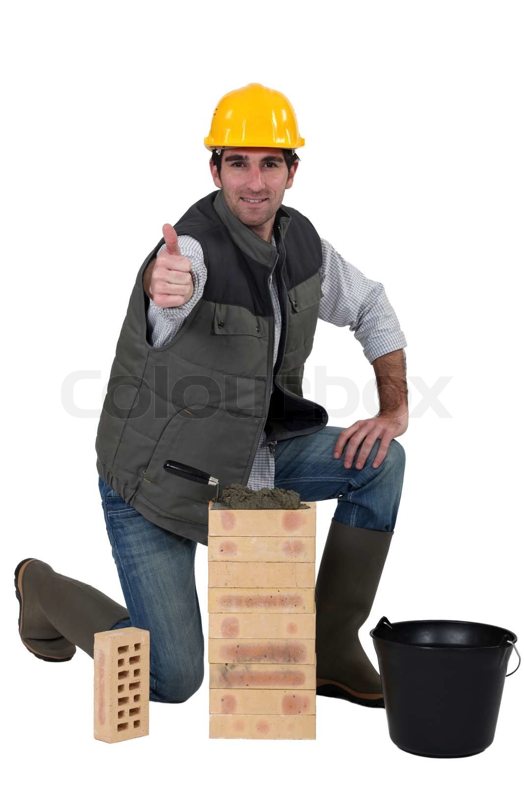 Maurer mit seinem Zeichen der Zustimmung | Stock Bild | Colourbox