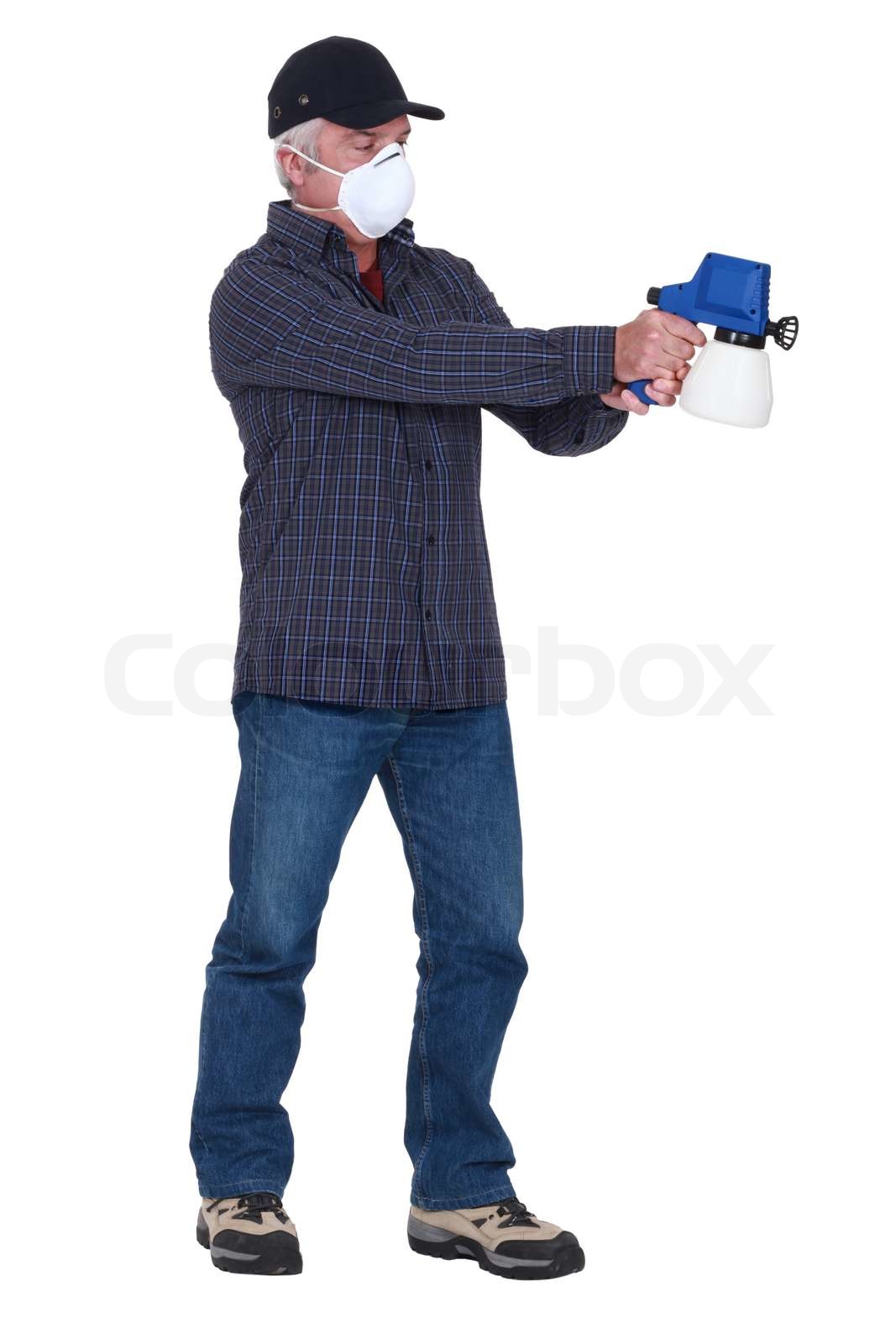 Man with a pressure sprayer | Stock image | Colourbox