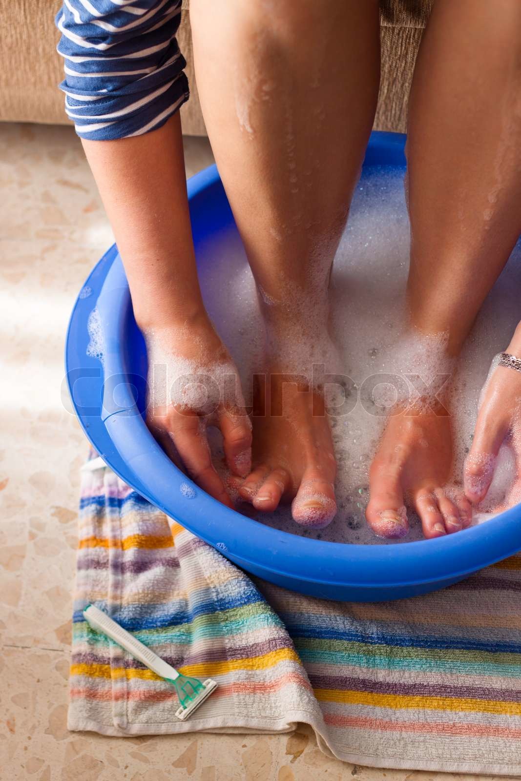 Female legs in soap bath | Stock image | Colourbox