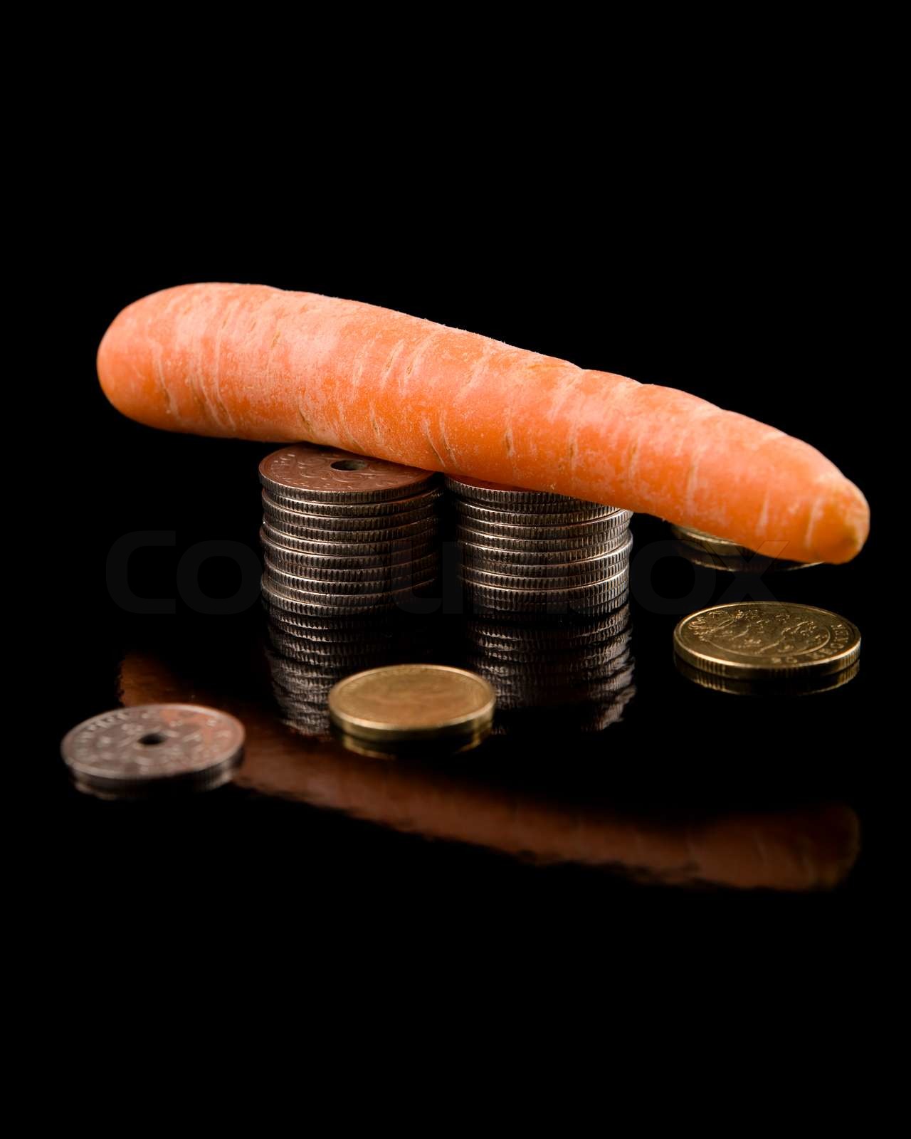 Carrot and money | Stock image | Colourbox