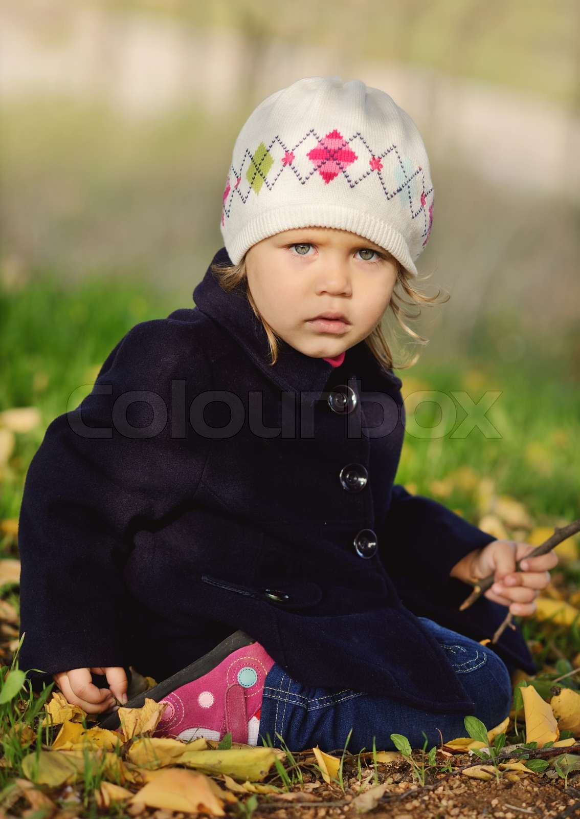 girl with stick | Stock image | Colourbox