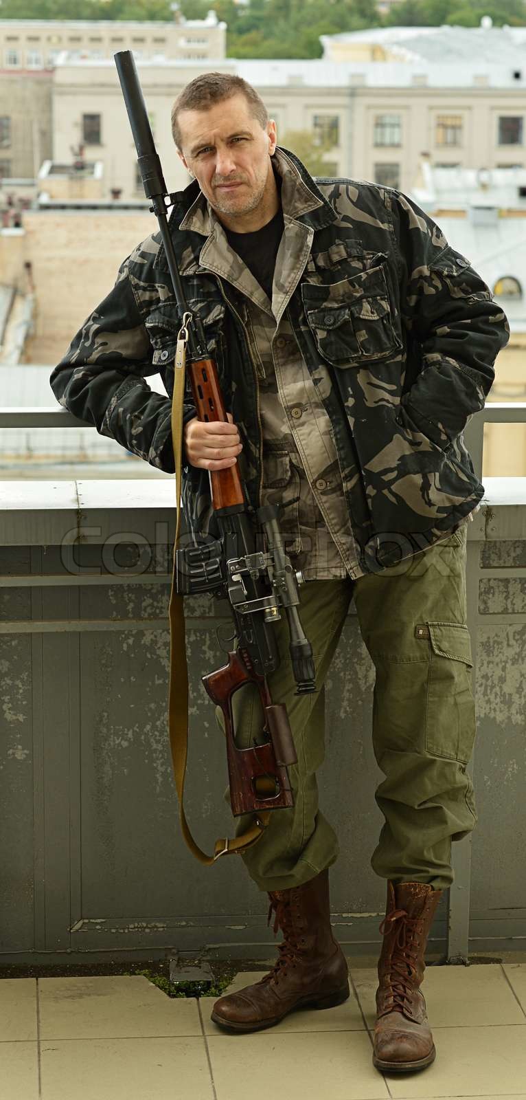 man with weapon | Stock image | Colourbox