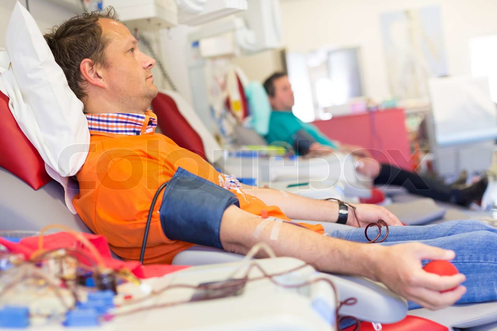 Blood donor at donation. | Stock image | Colourbox