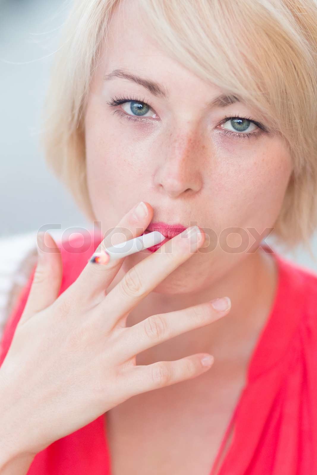 Lady smoking. | Stock image | Colourbox