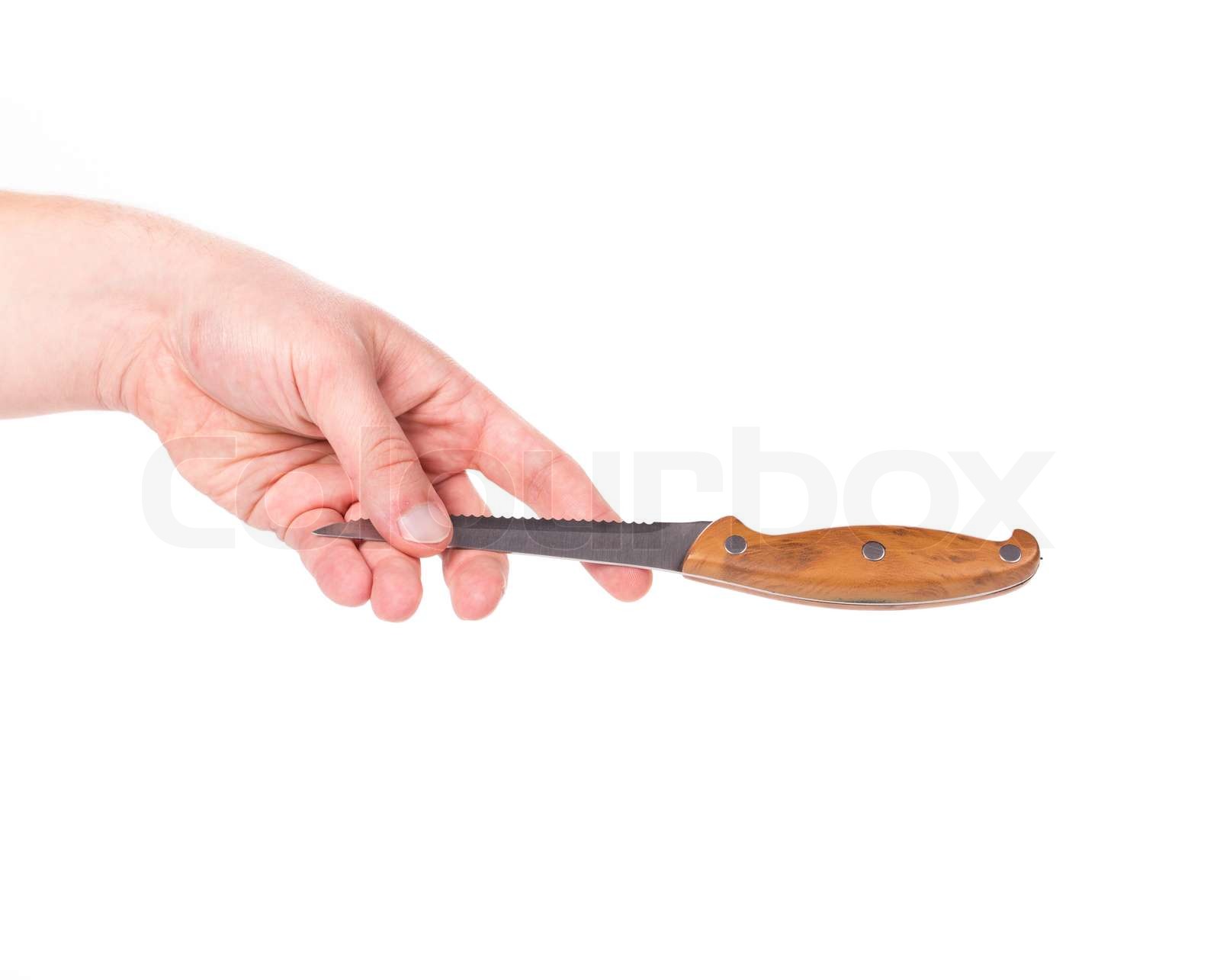 Messer in der Hand mit isoliert weiß | Stock Bild | Colourbox