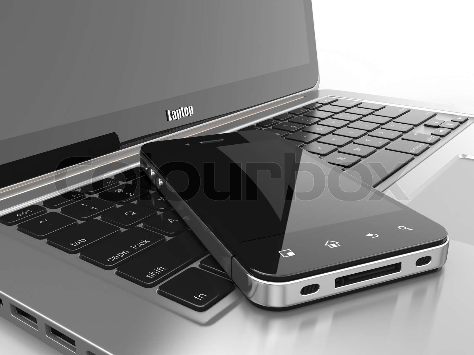Laptop and mobile phone. | Stock image | Colourbox