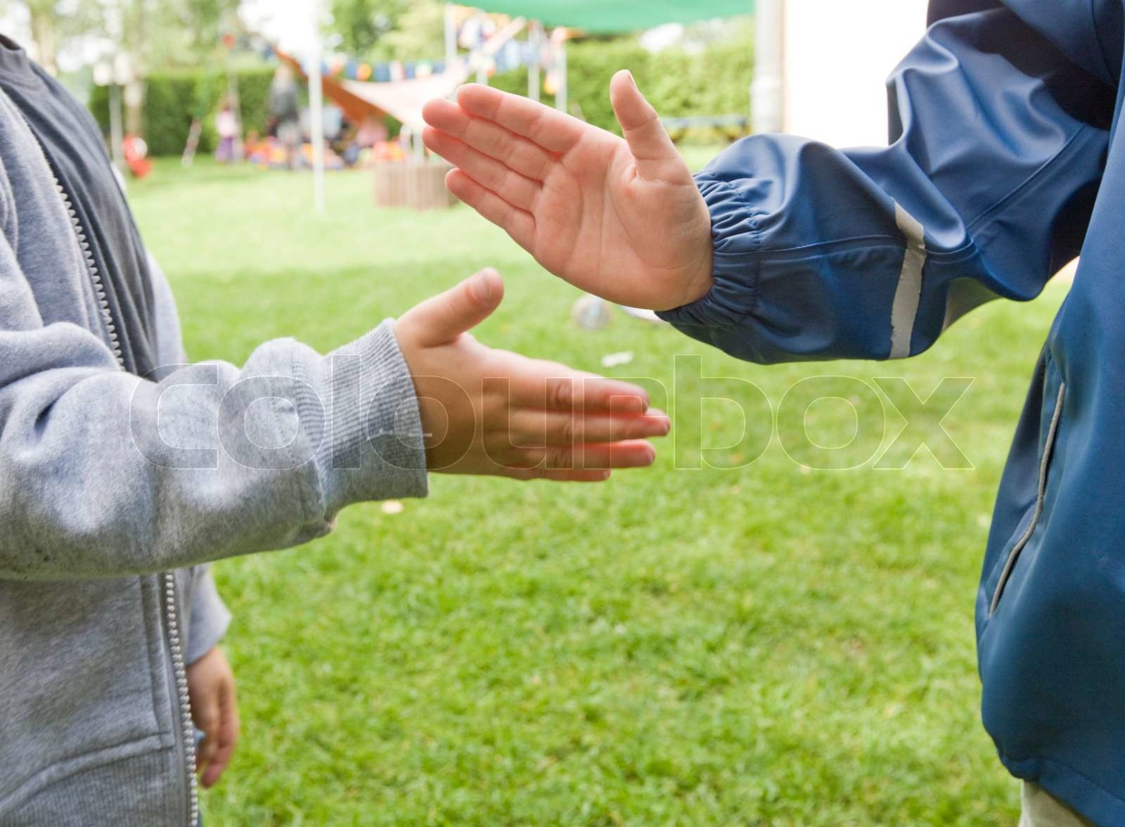 Cropped image of children's hands clapping | Stock image | Colourbox