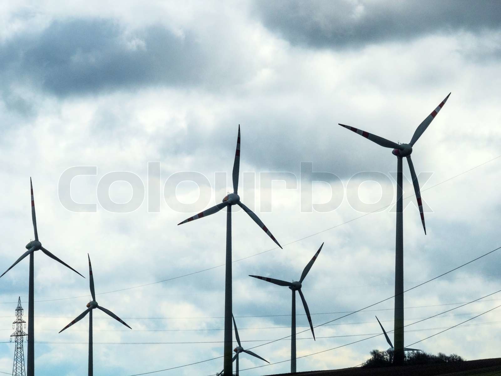 wind turbine and power poles | Stock image | Colourbox