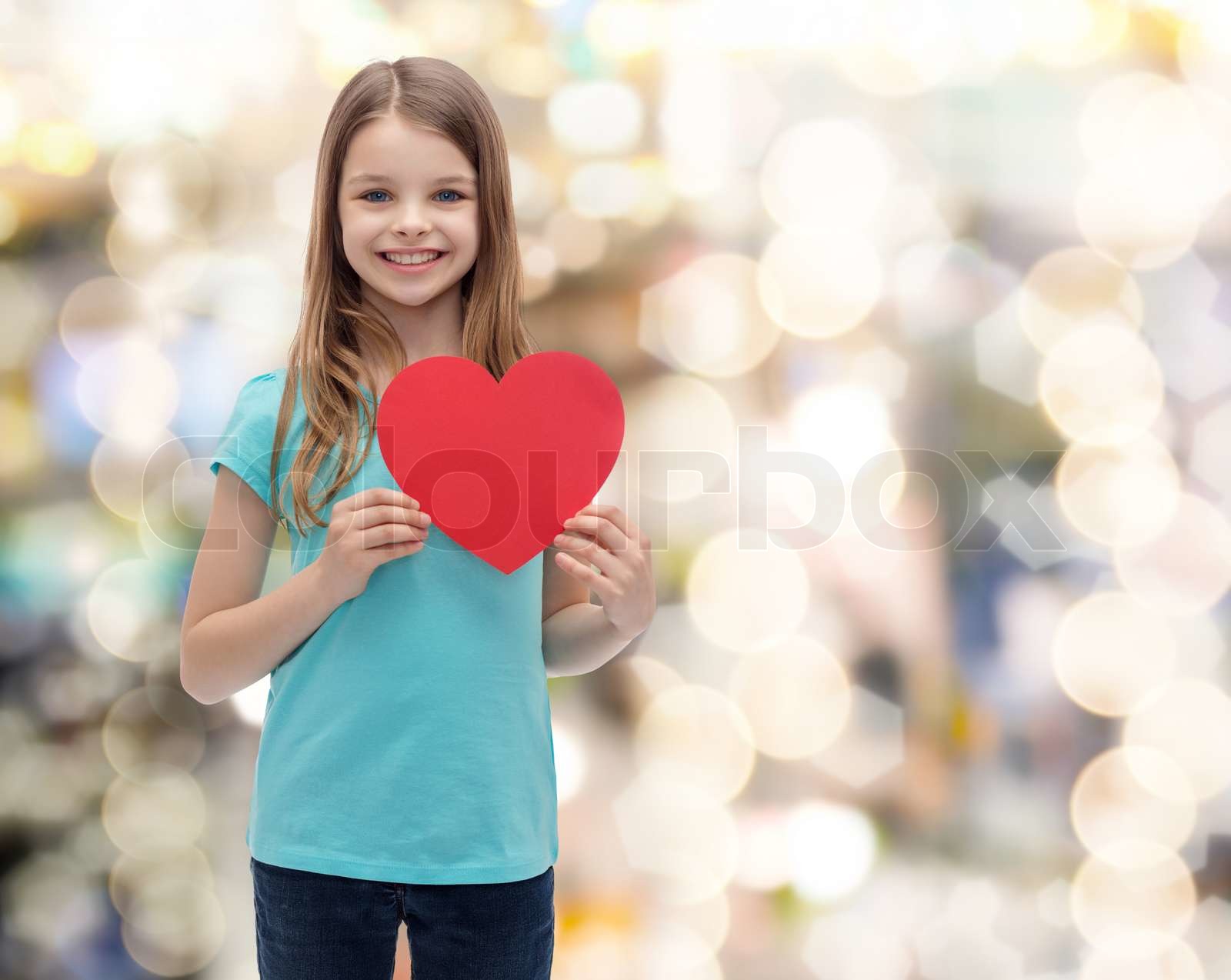 Smiling Little Girl With Red Heart Stock Image Colourbox