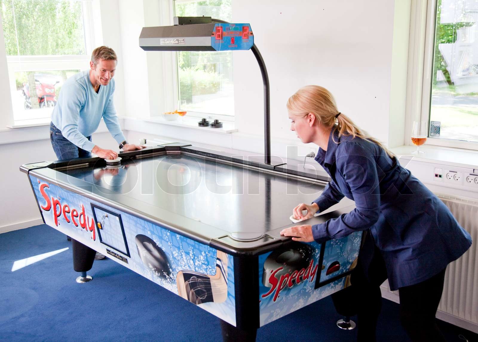 Business people having fun i the break/ recreation room. Colleagues ...