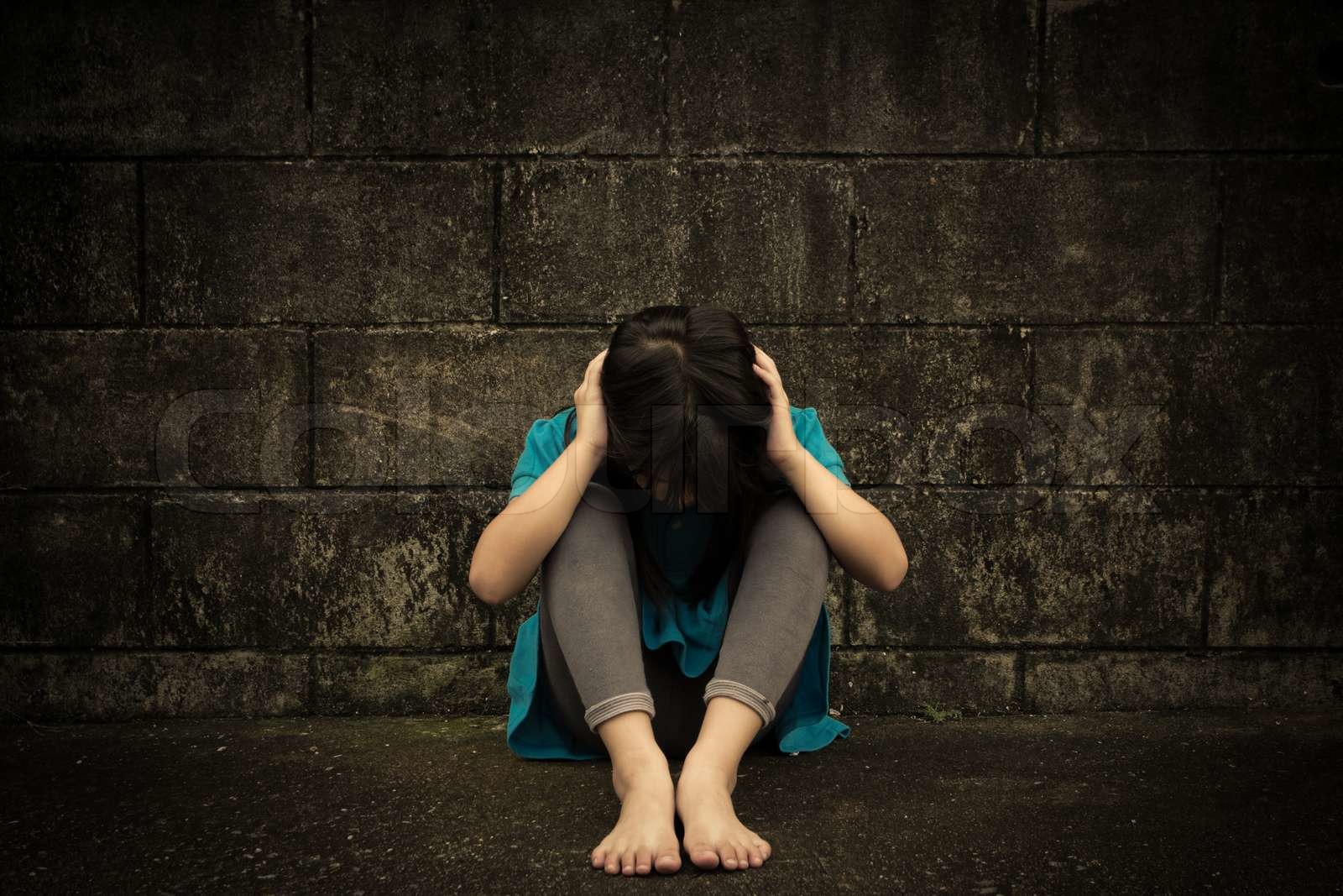 sad and depressed little girl | Stock image | Colourbox