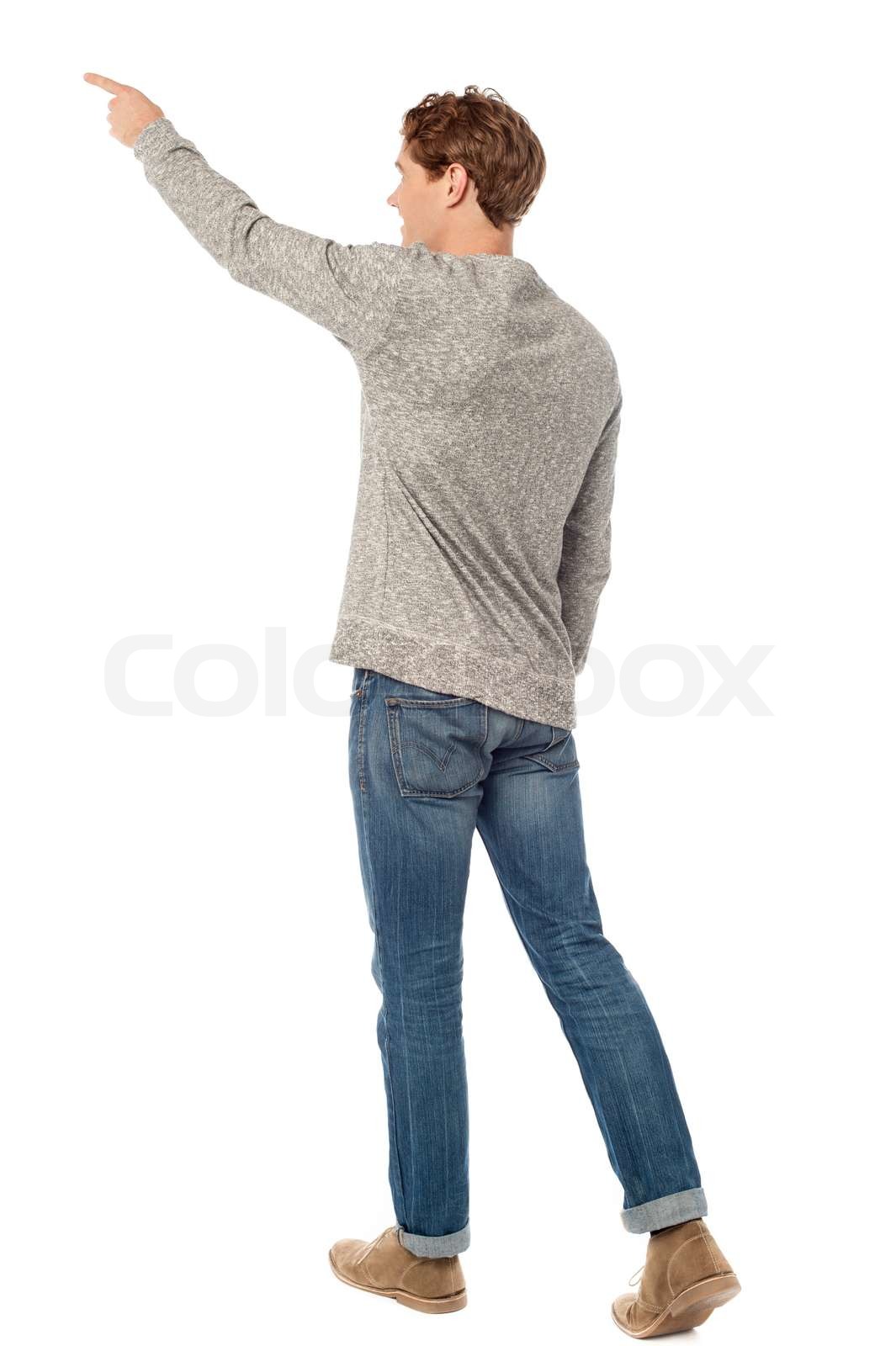 Caucasian man standing pointing | Stock image | Colourbox