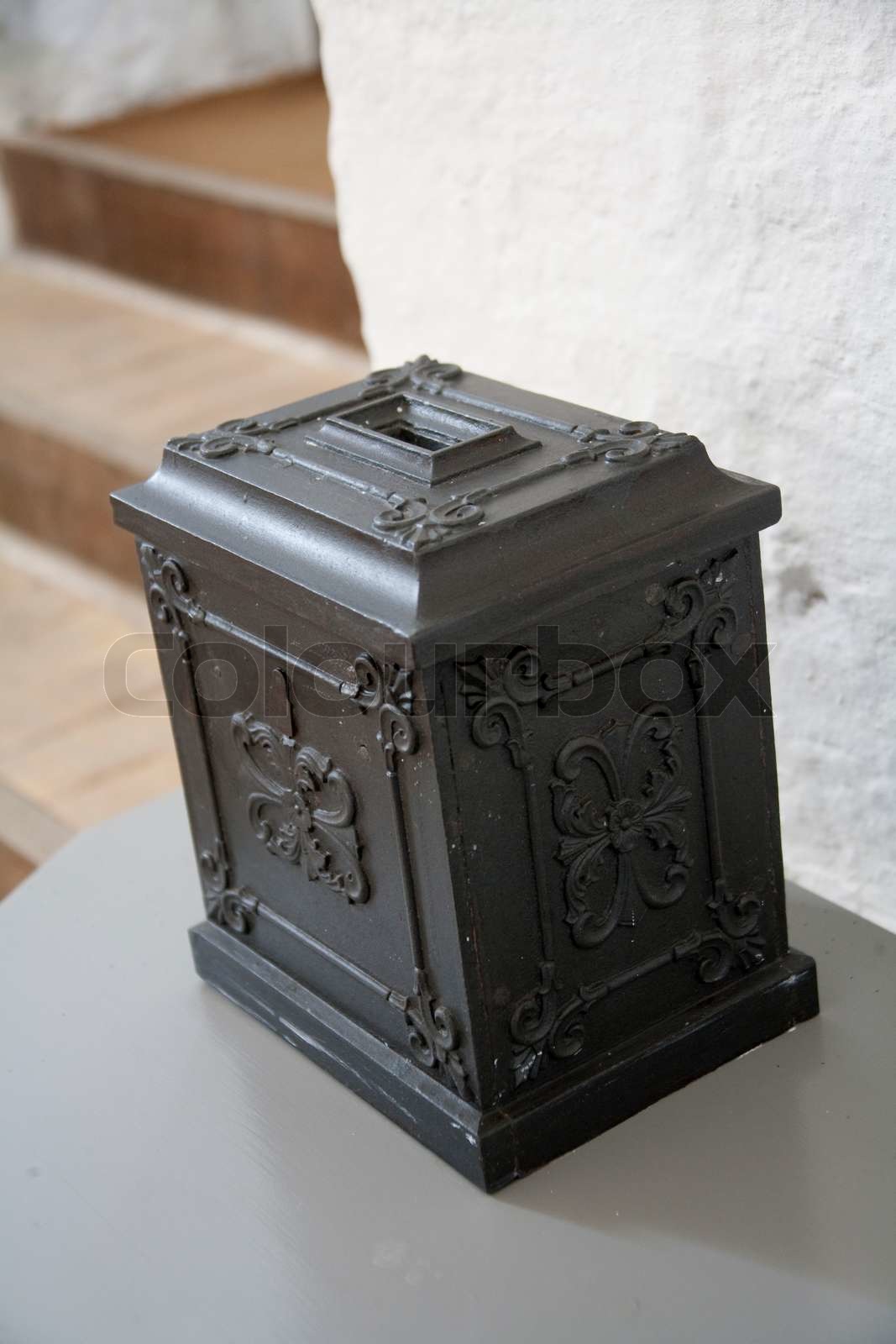 Donation box inside a church | Stock image | Colourbox