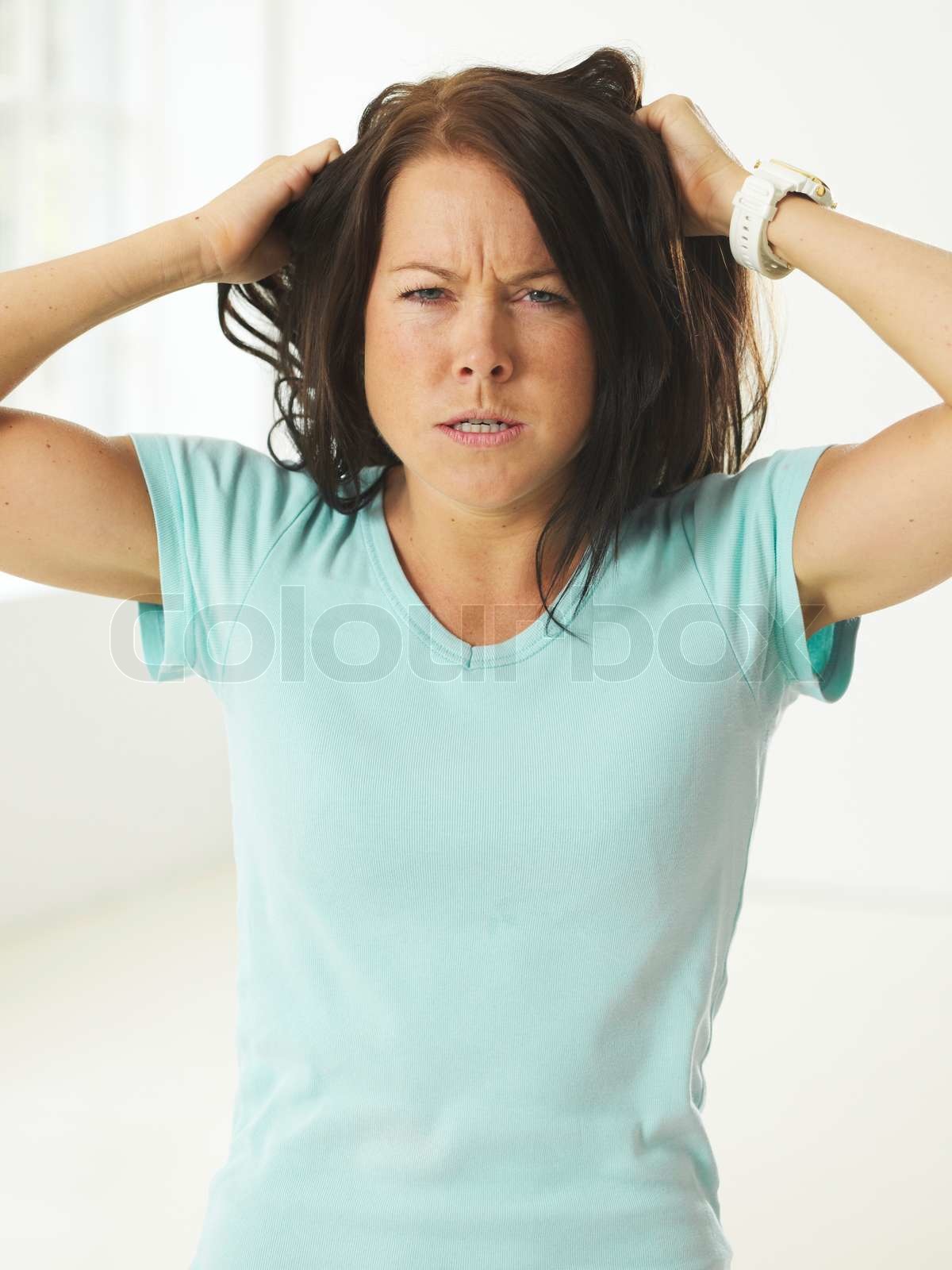 Portrait of a very frustrated woman | Stock image | Colourbox
