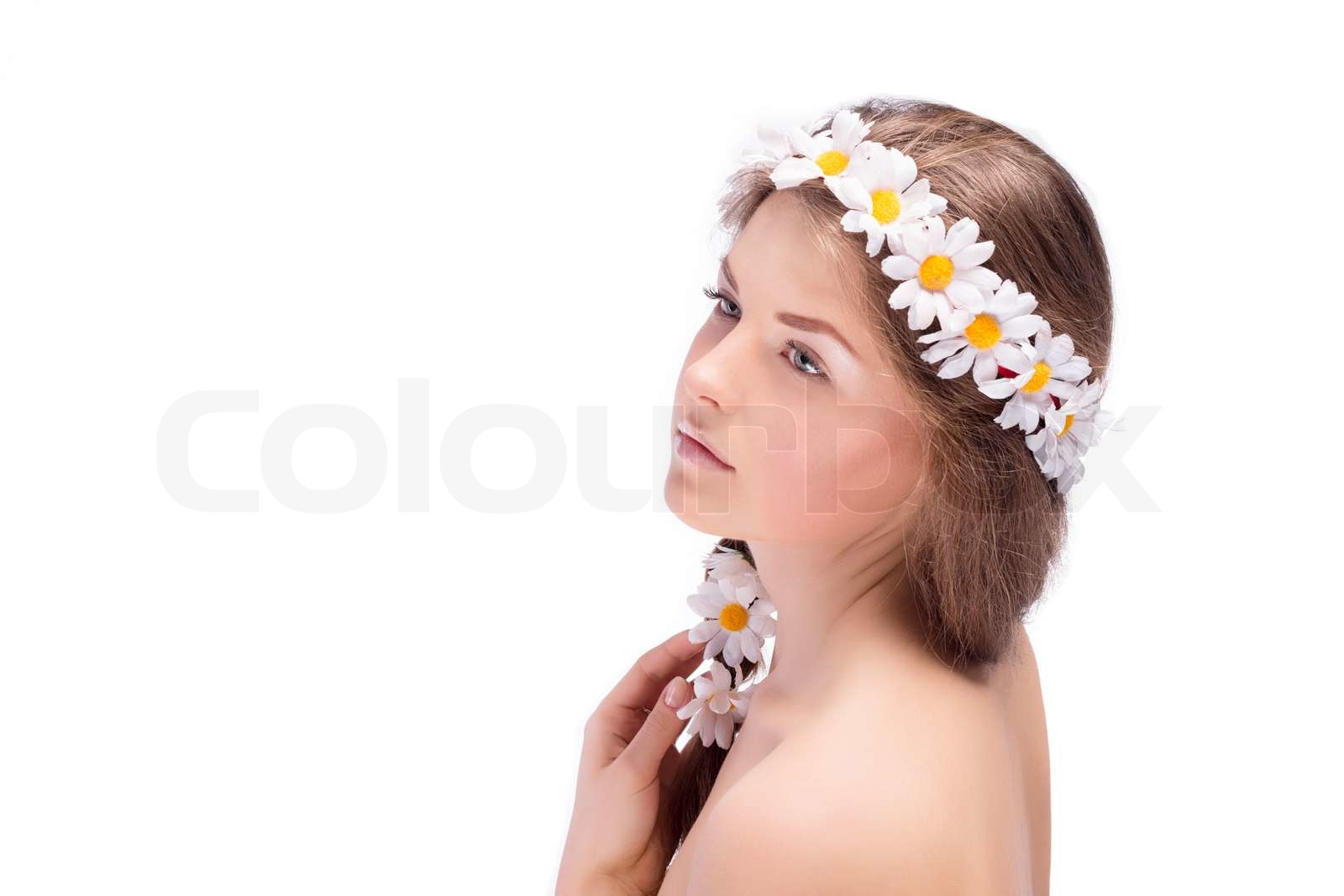 Сlose Portrait Of Beautiful Naked Woman With Light Makeup And Flowers