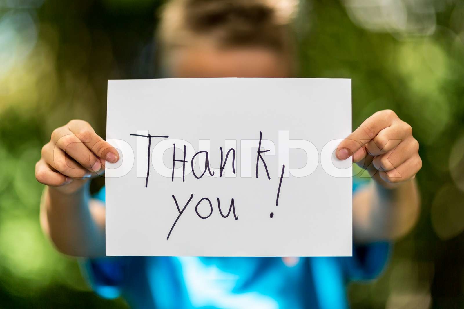 Boy with Thank You sign | Stock image | Colourbox