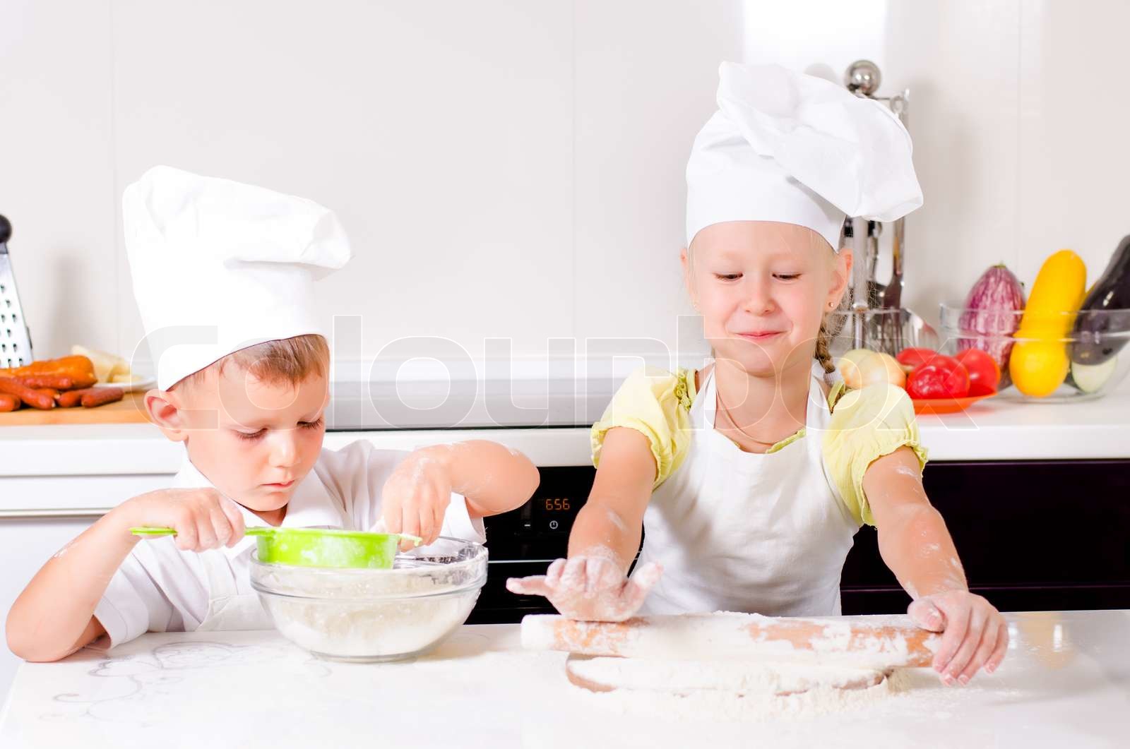Teamwork in the kitchen | Stock image | Colourbox
