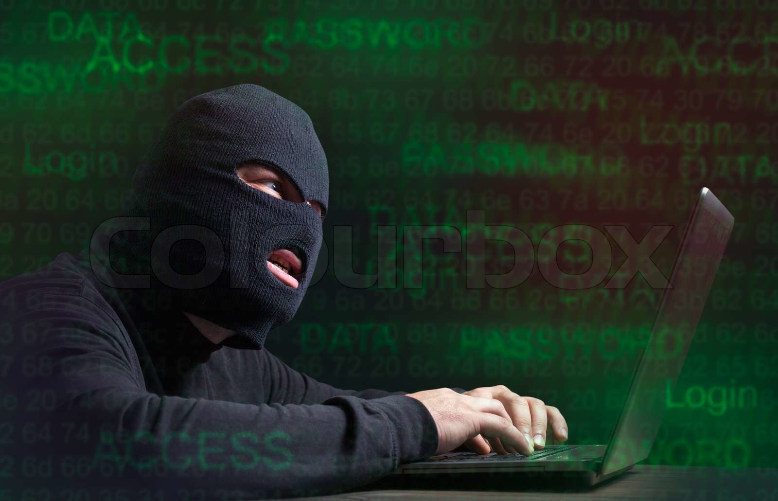 Hacker in a balaclava | Stock image | Colourbox