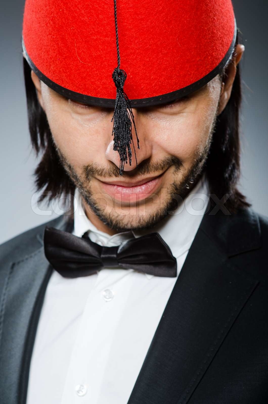 Man in traditional turkish hat and dress | Stock image | Colourbox