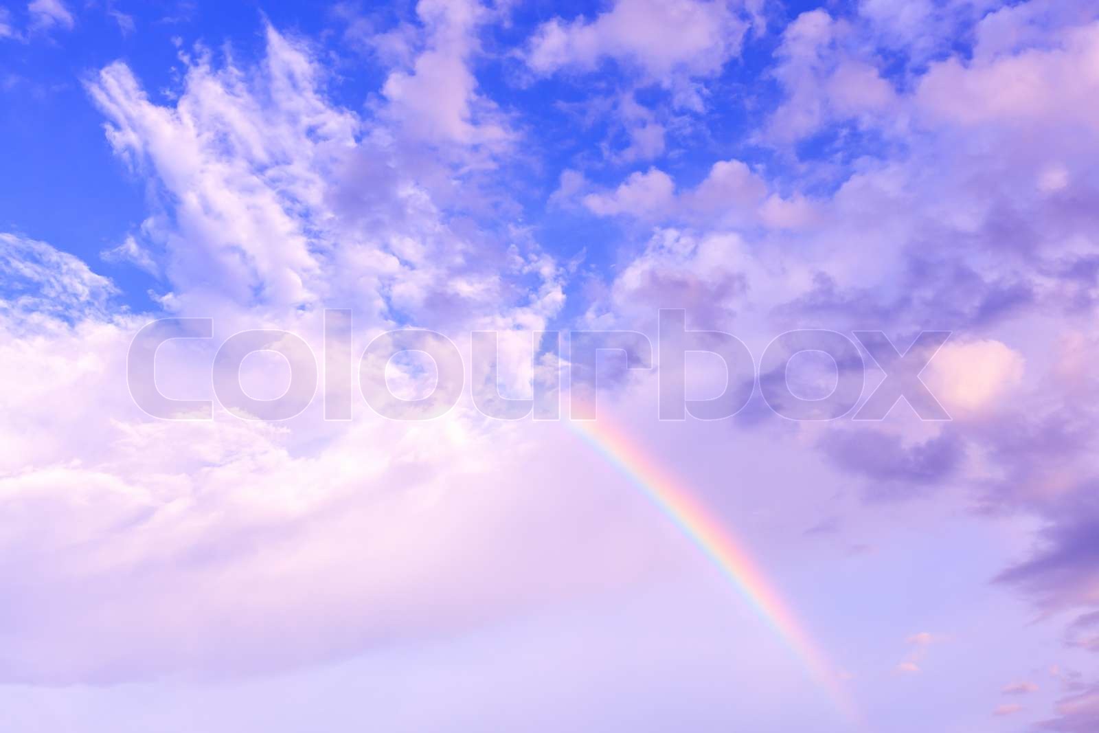 rainbow and blue sky, natural phenomenon | Stock image | Colourbox