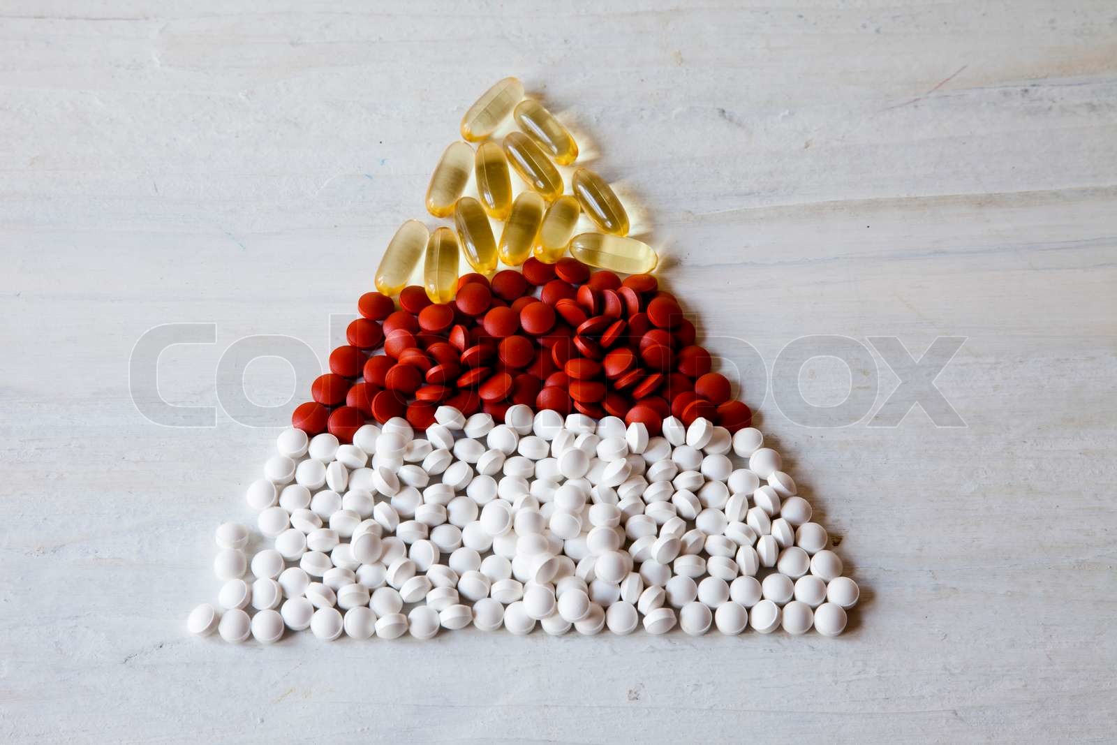 Pyramid of vitamin supplements | Stock image | Colourbox