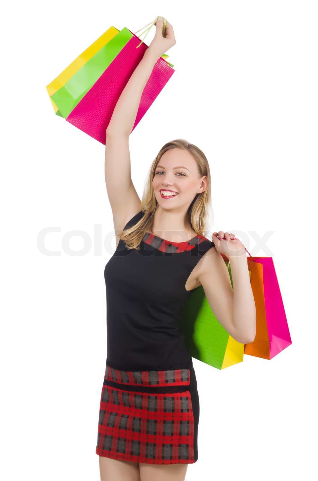 Woman after shopping spree on white | Stock image | Colourbox