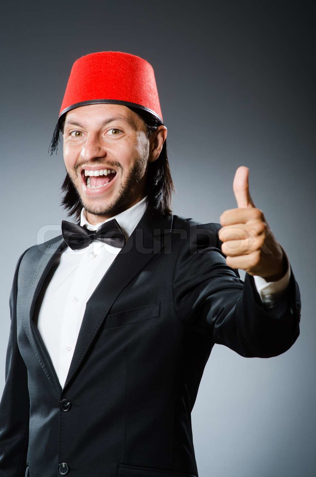Man in traditional turkish hat and dress | Stock image | Colourbox