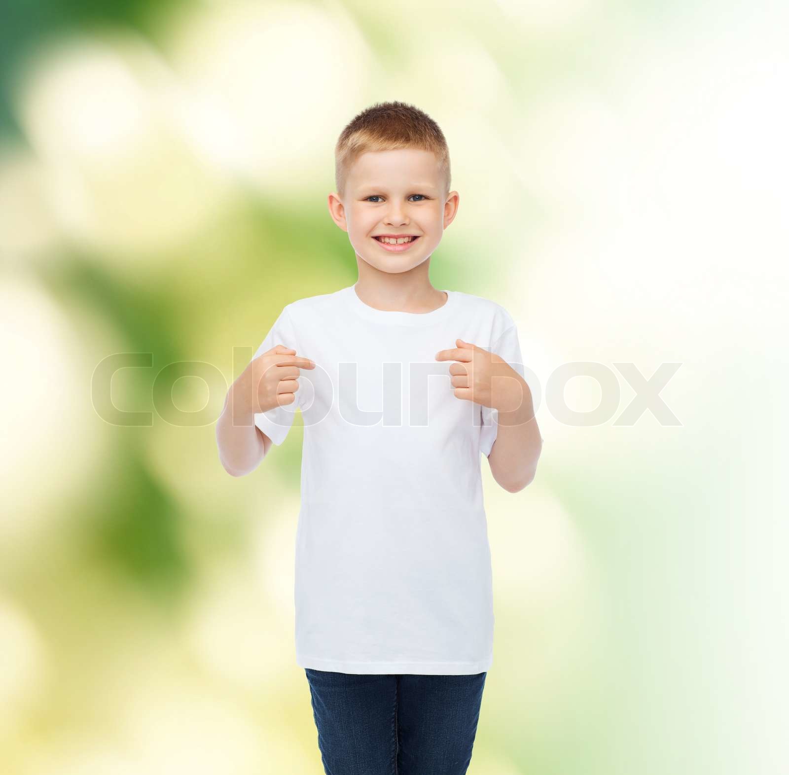 smiling little boy in white blank t-shirt | Stock image | Colourbox