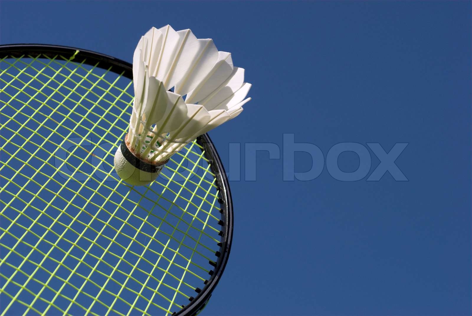 Badminton action close-up with racket and shuttlecock | Stock image ...