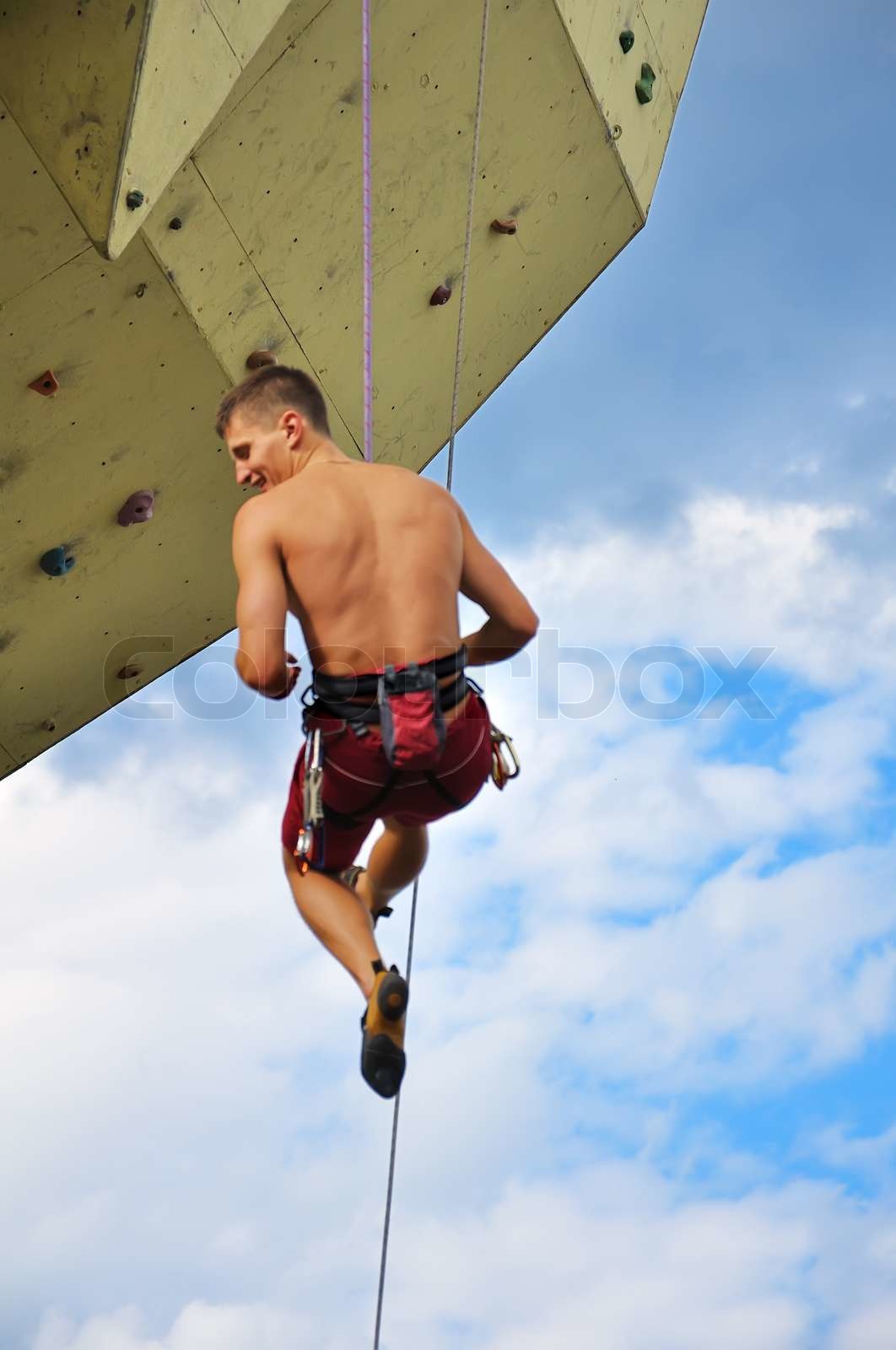 Climber hanging on a rope | Stock image | Colourbox