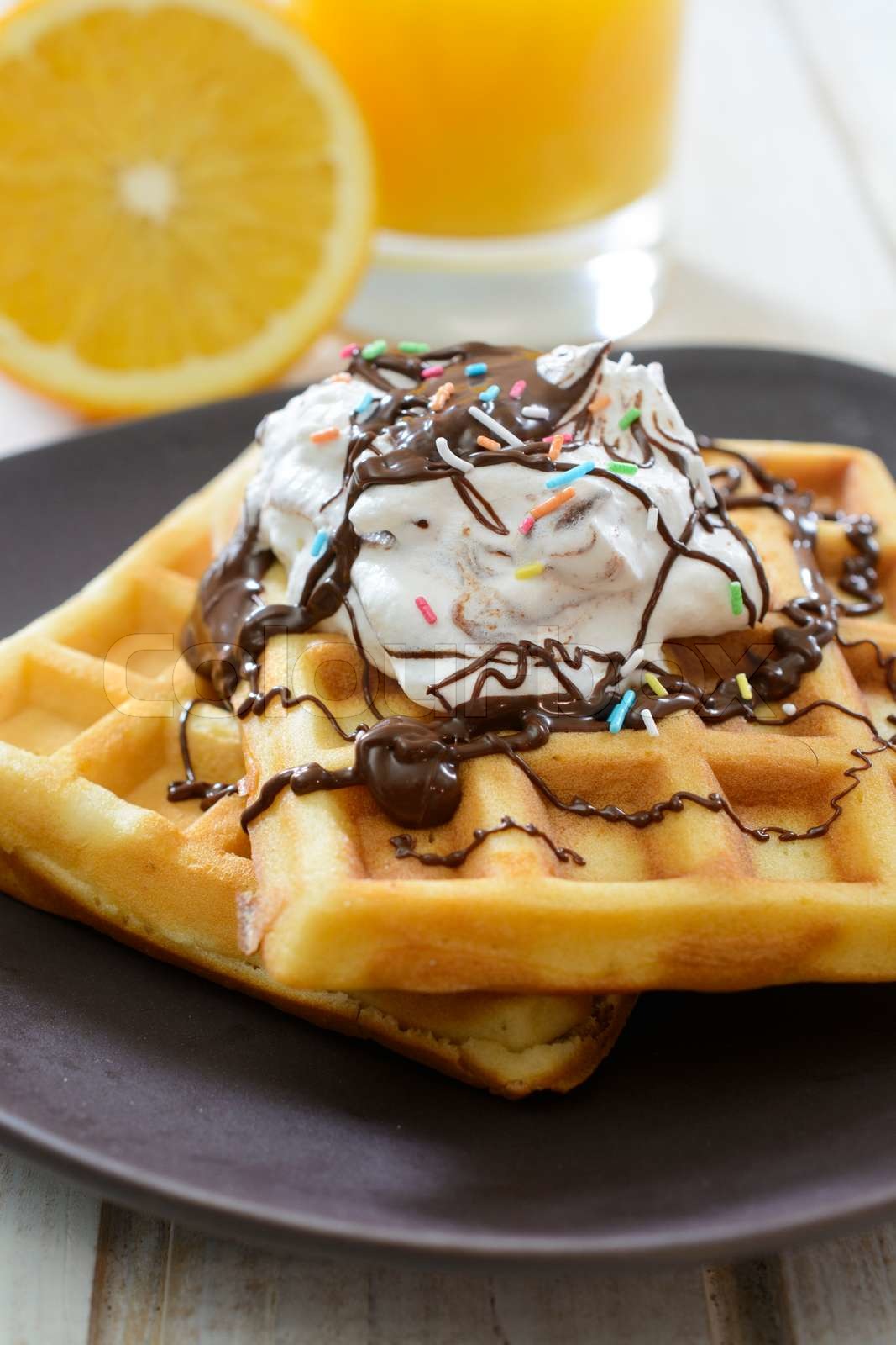 Sweet waffels with cream and chocolate | Stock image | Colourbox